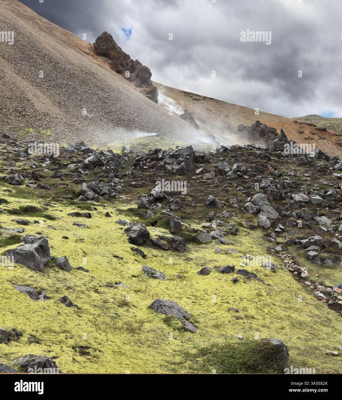 Rhyolite mountains smoldering underground heat. In the hollows lie ...