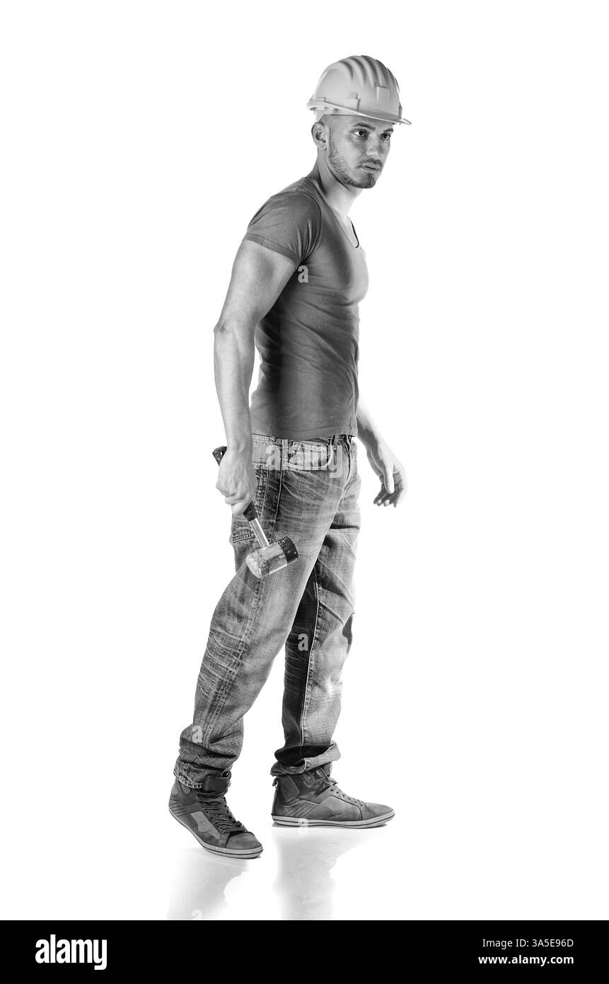 Full body shot of construction worker with hard hat and hammer ...