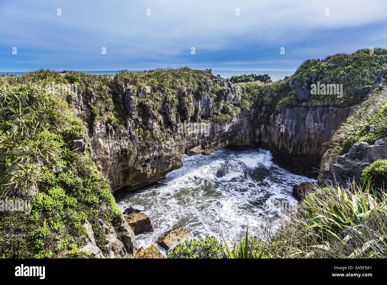 Scenic natural pool on the ocean shore. New Zealand, South Island ...