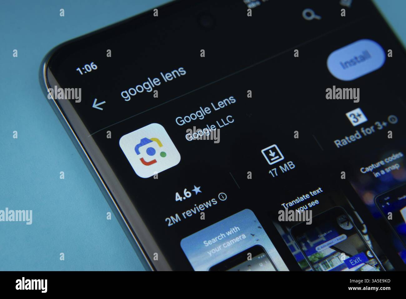 The Google lens app from Google Playstore is displayed on a smartphone ...