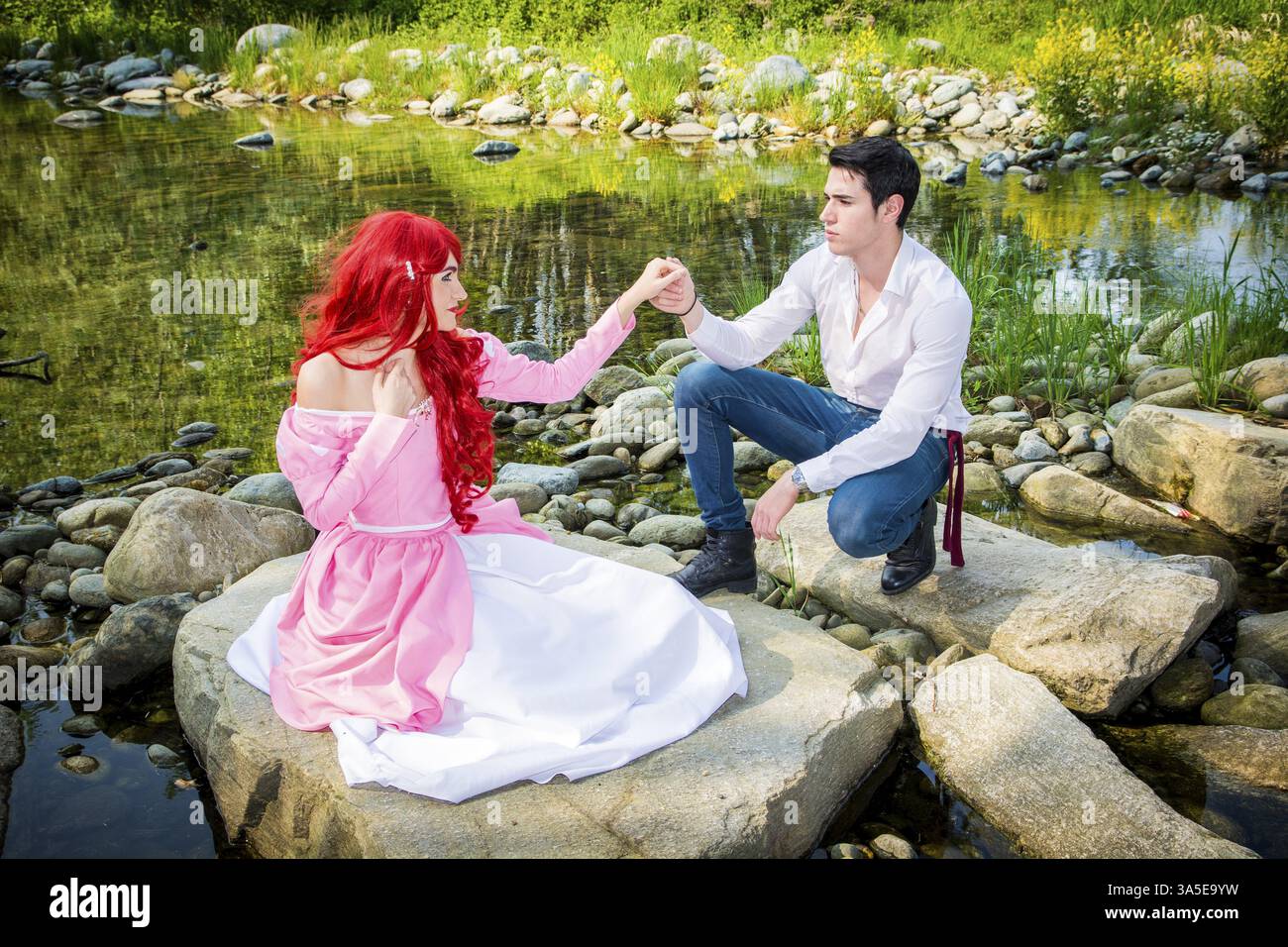 Romantic Fairy Tale Couple Sitting on Rocks at River Side in Peaceful ...