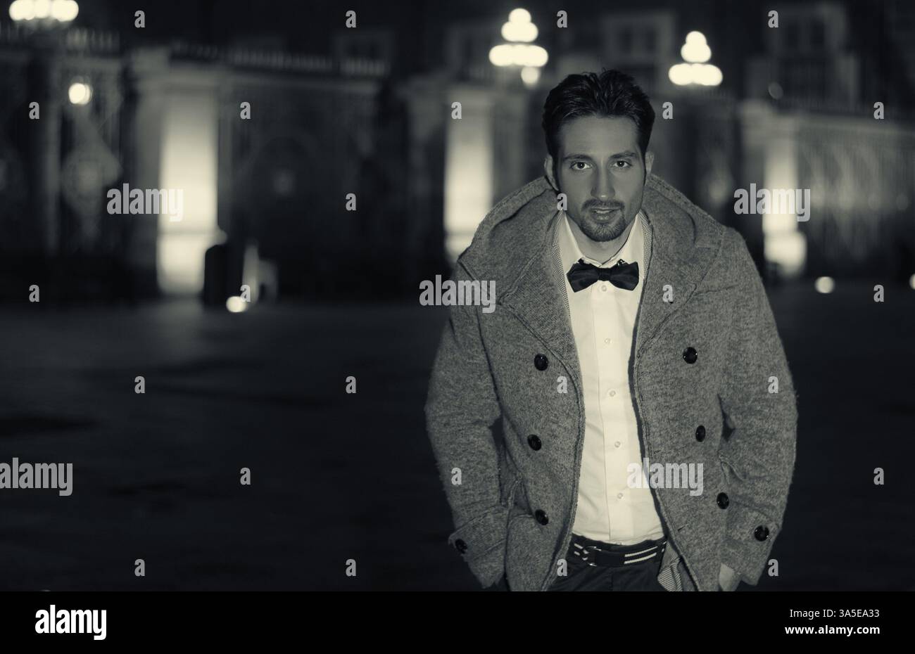 Attractive young man at night in Piazza Castello in Turin, Italy ...