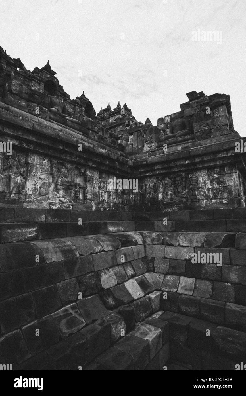 Ancient temple structure with detailed stone reliefs in a mystical ...
