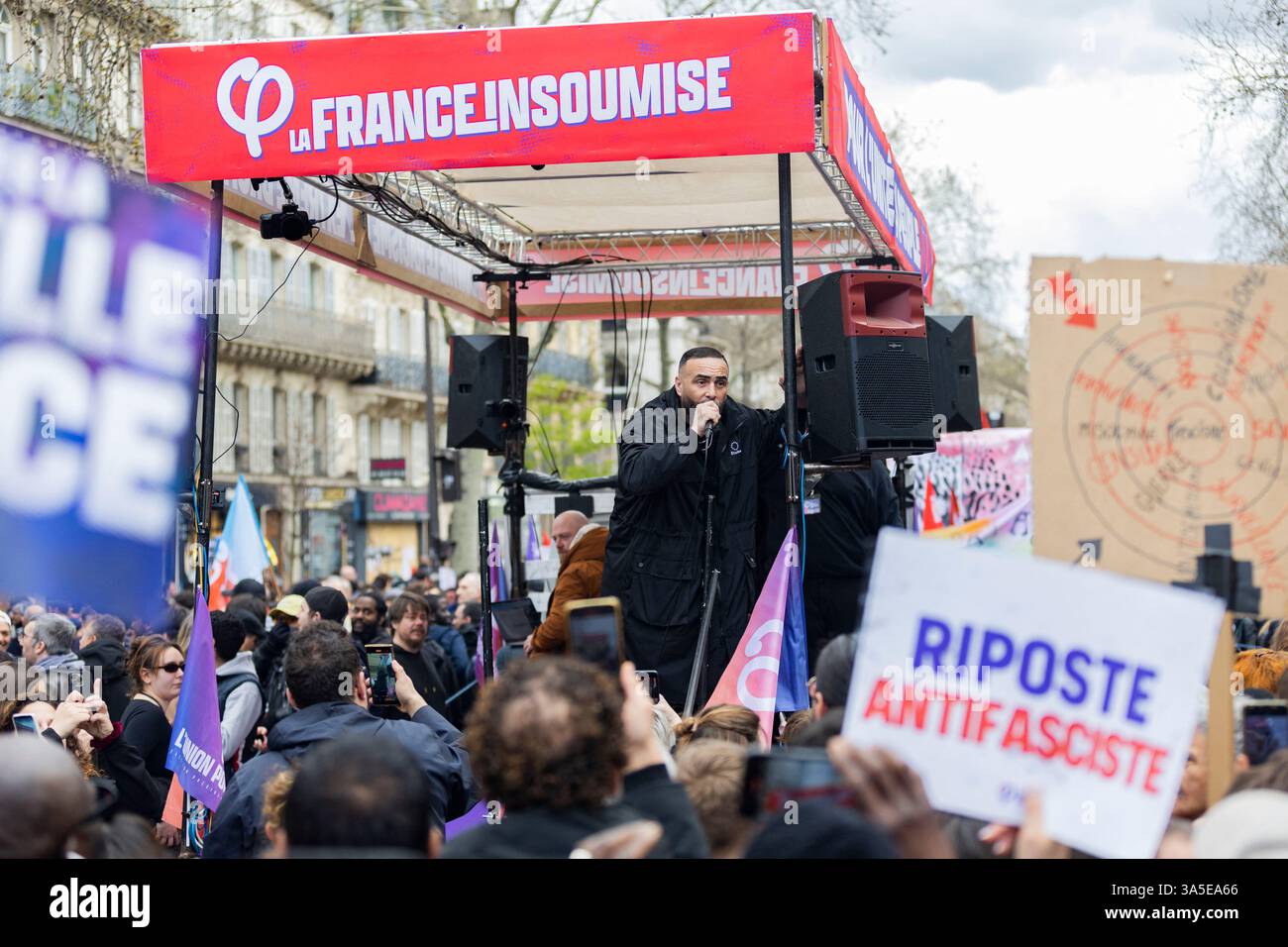 French rapper Medine speaks to the crowd at the march against racism ...