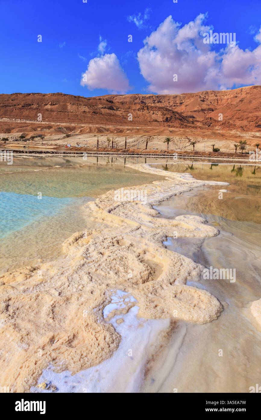 The evaporated salt forms freakish patterns on a water surface. The ...