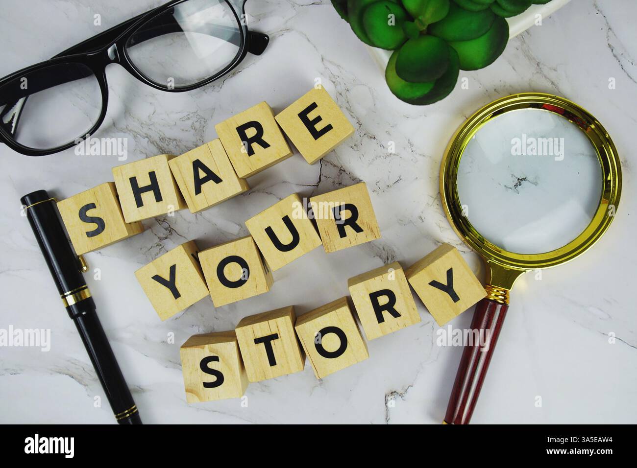 Share Your Story with wooden blocks alphabet letters and Magnifying ...