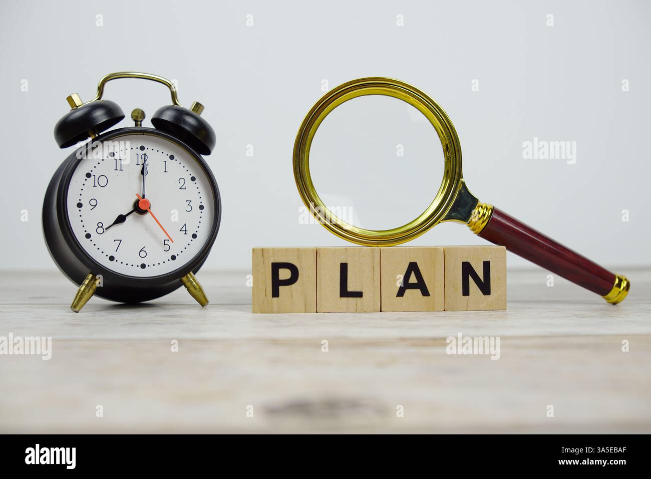Time to plan with wooden blocks alphabet letters and Magnifying glass ...