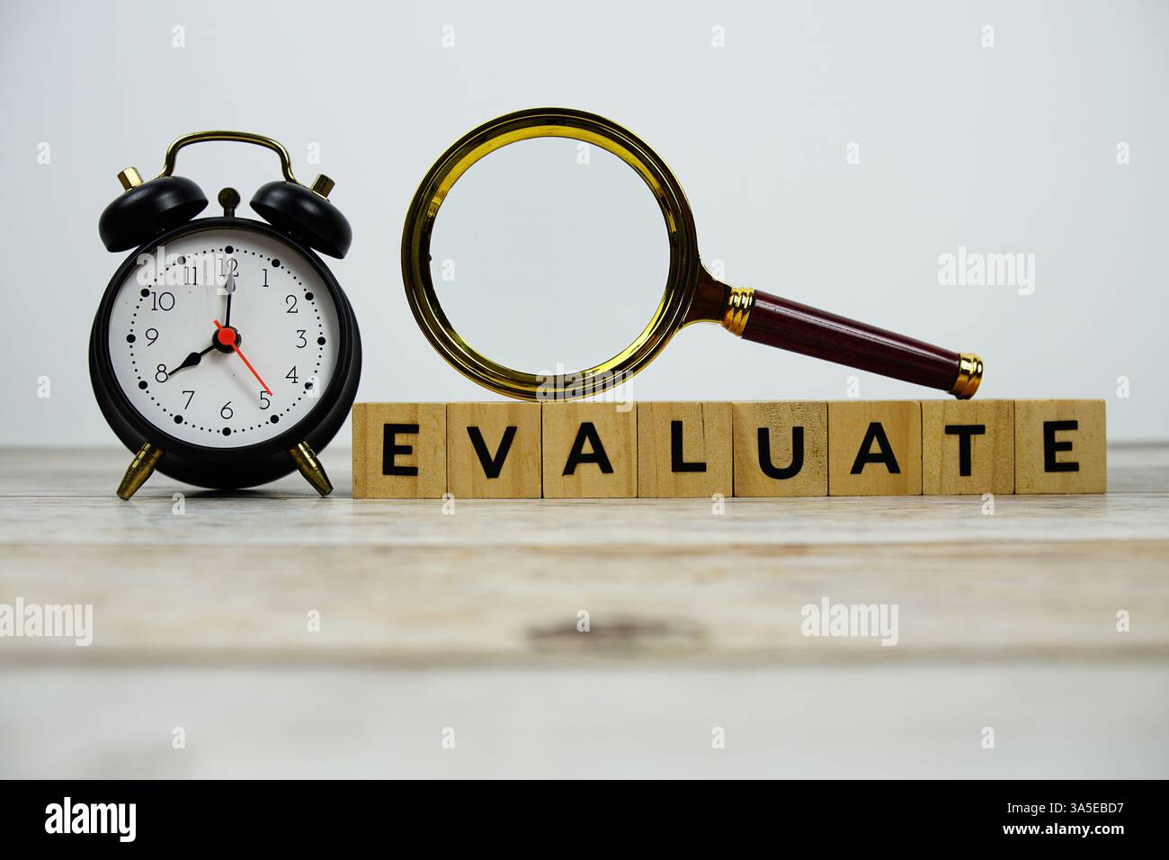 Time to Evaluate with wooden blocks alphabet letters and Magnifying ...