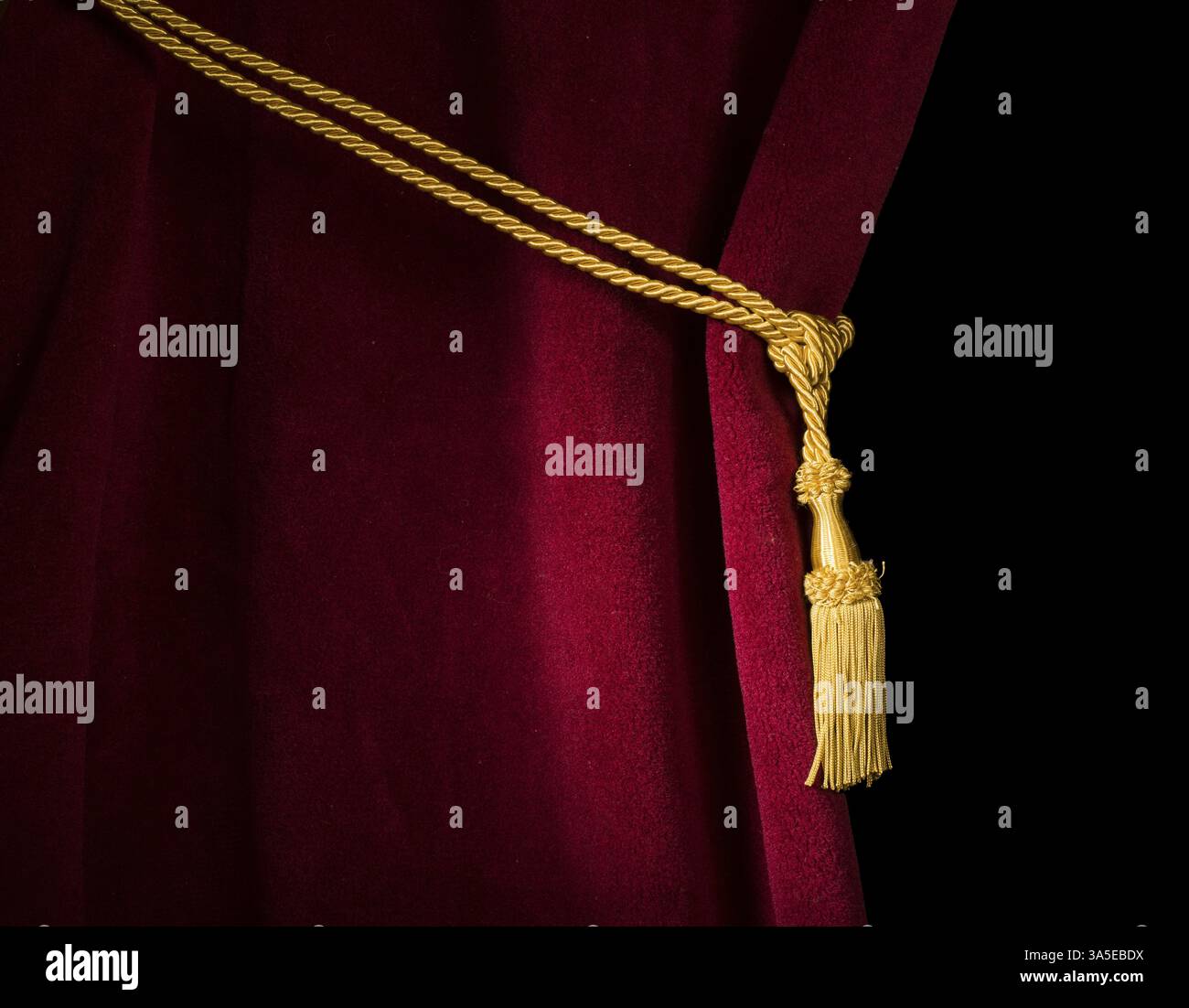 Red velvet curtain with tassel. Close up black isolated curtain Stock ...