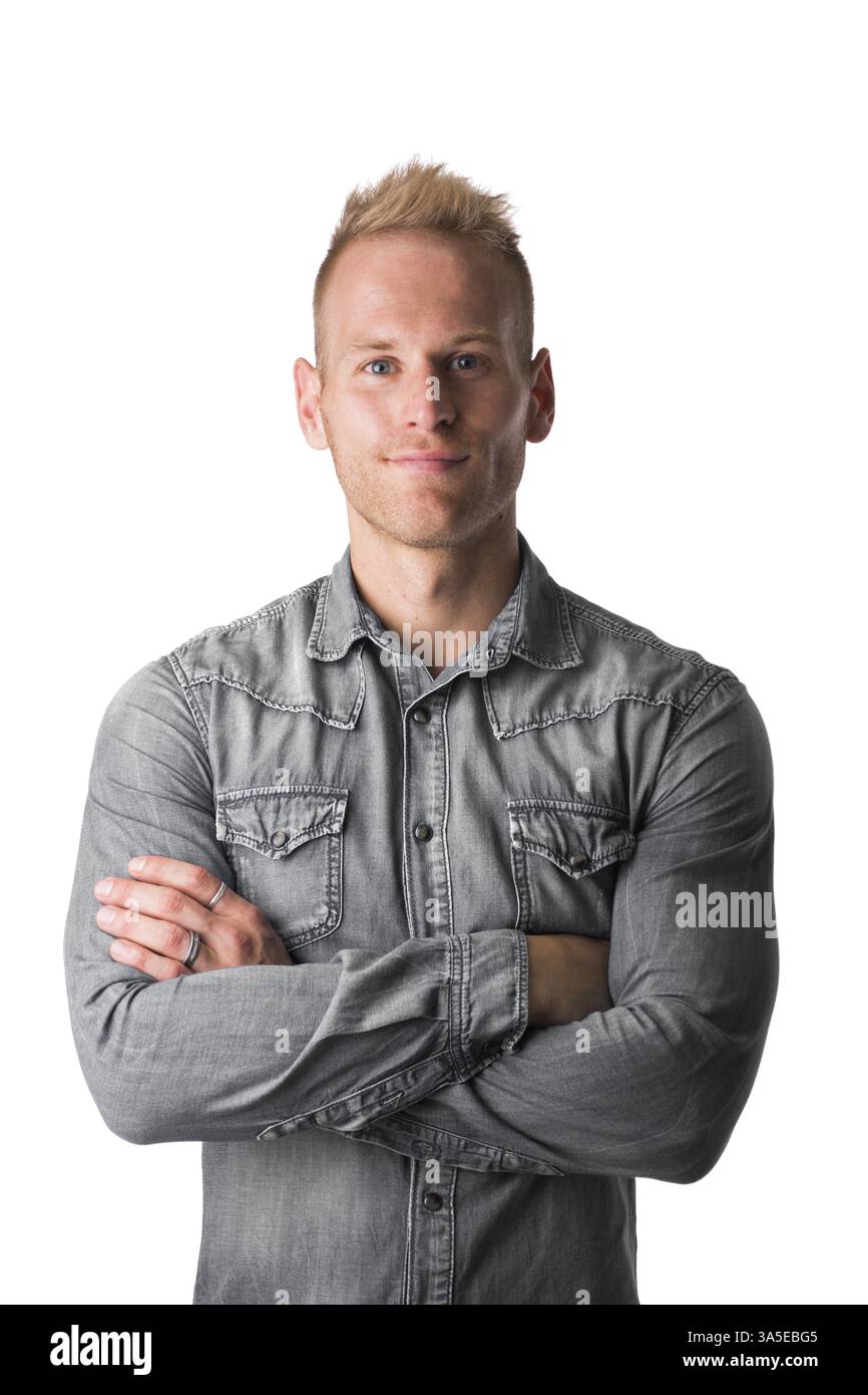 Fit male model posing with a lot of confidence, arms crossed on his ...