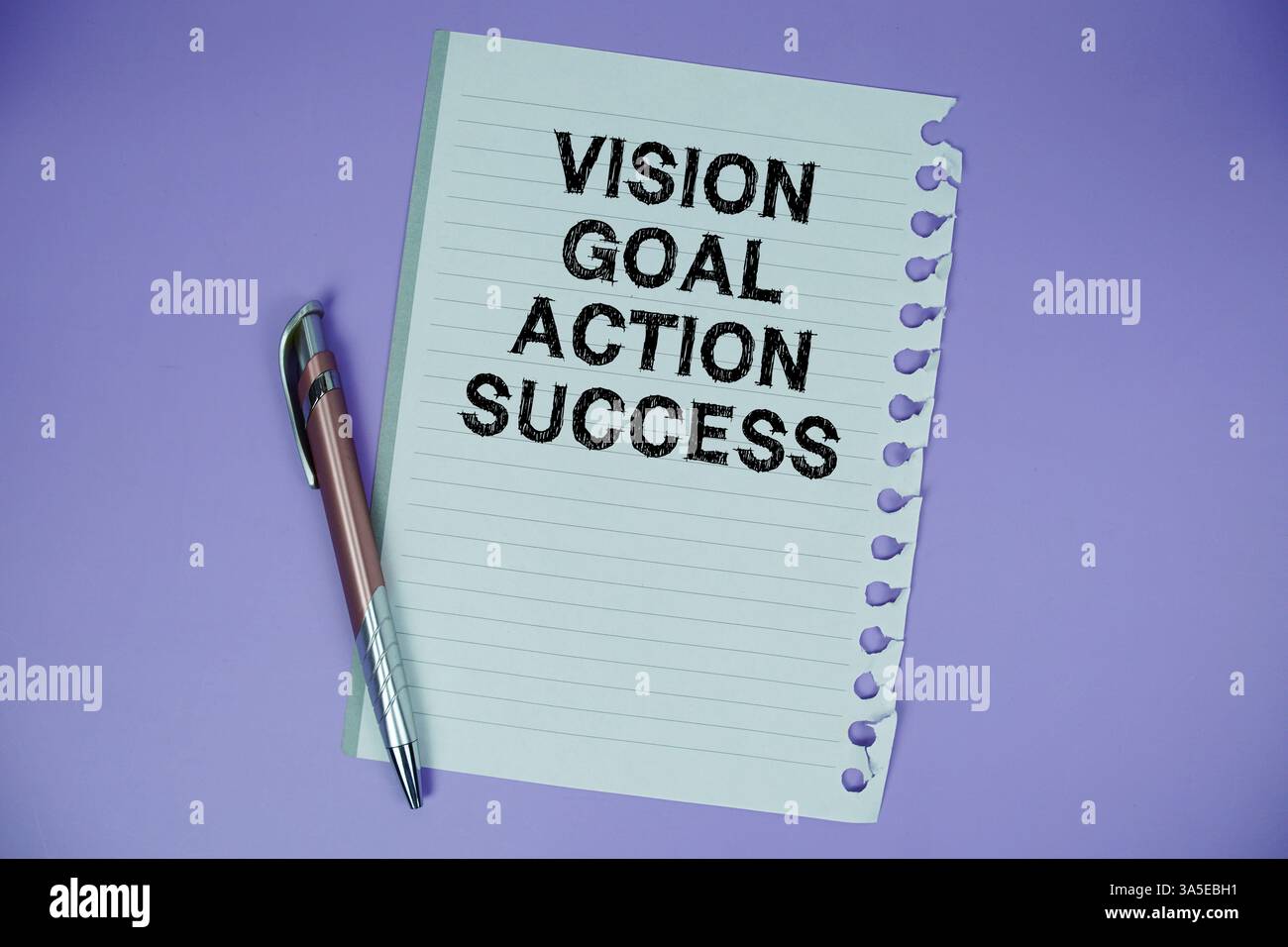 Vision Goal Action Success text written on paper with pen on purple ...