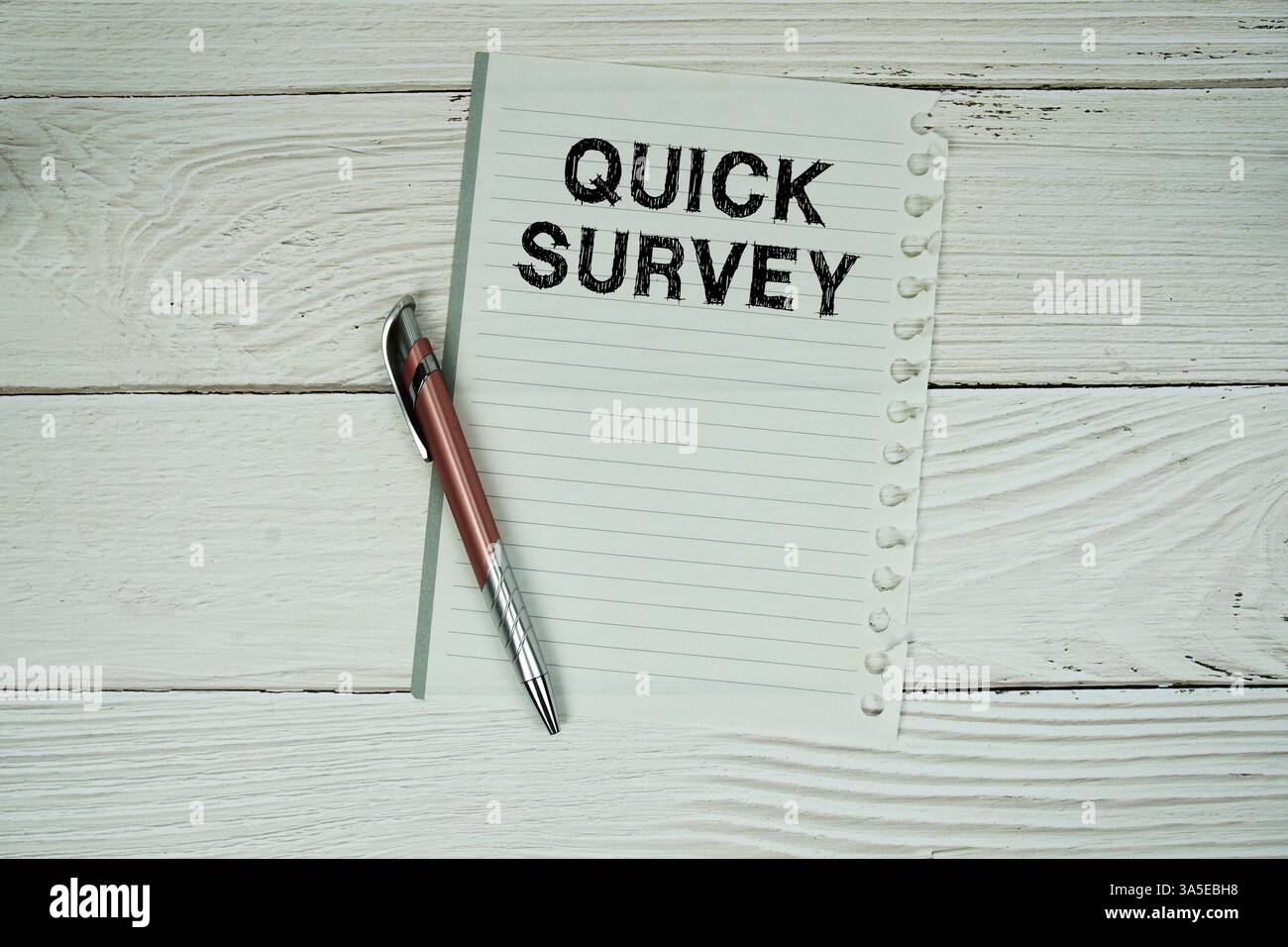Quick Survey text written on paper with pen and magnifying glass flat lay on wooden background ...