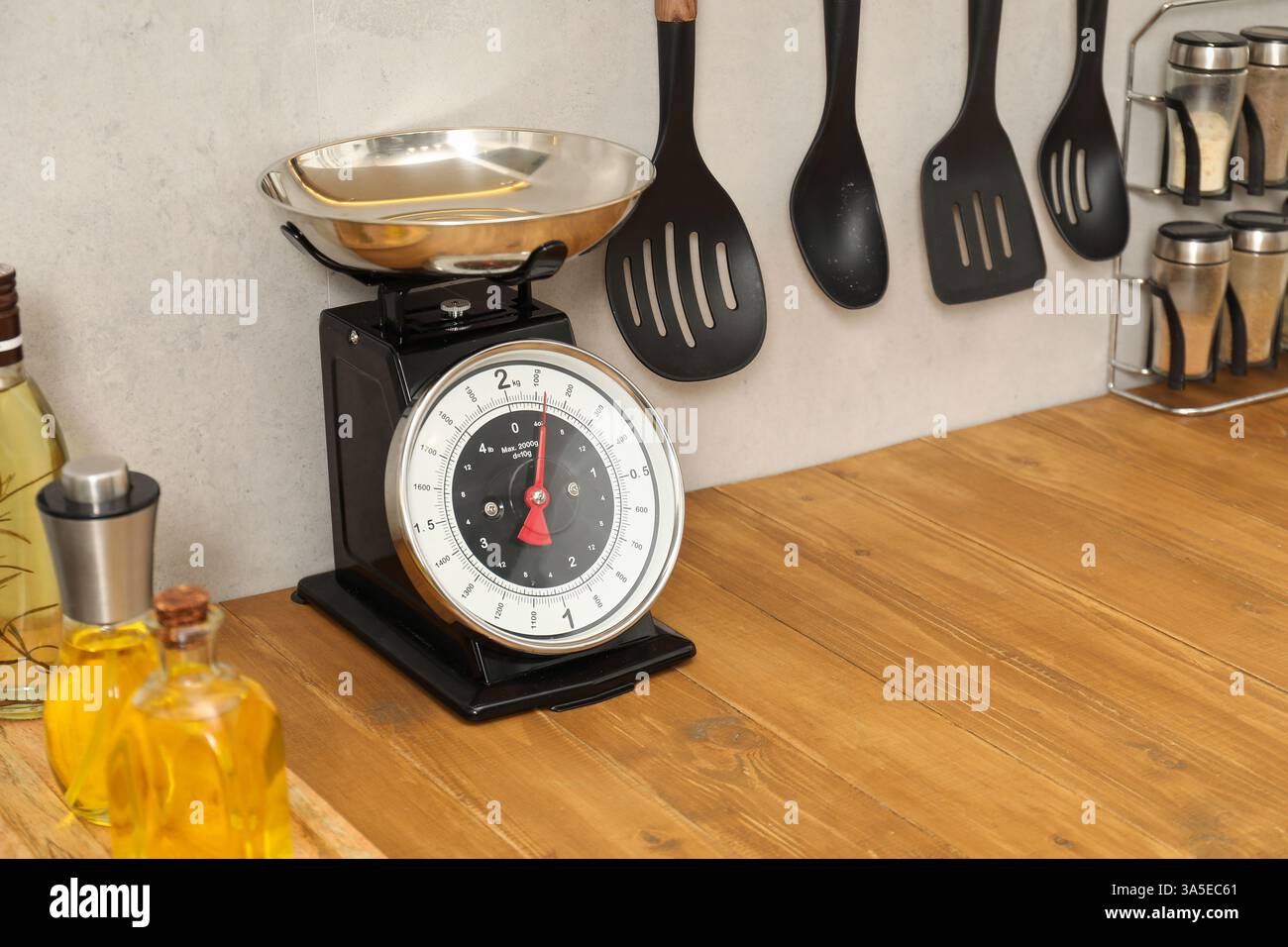 Retro mechanical kitchen scale, other utensils and spices indoors Stock ...