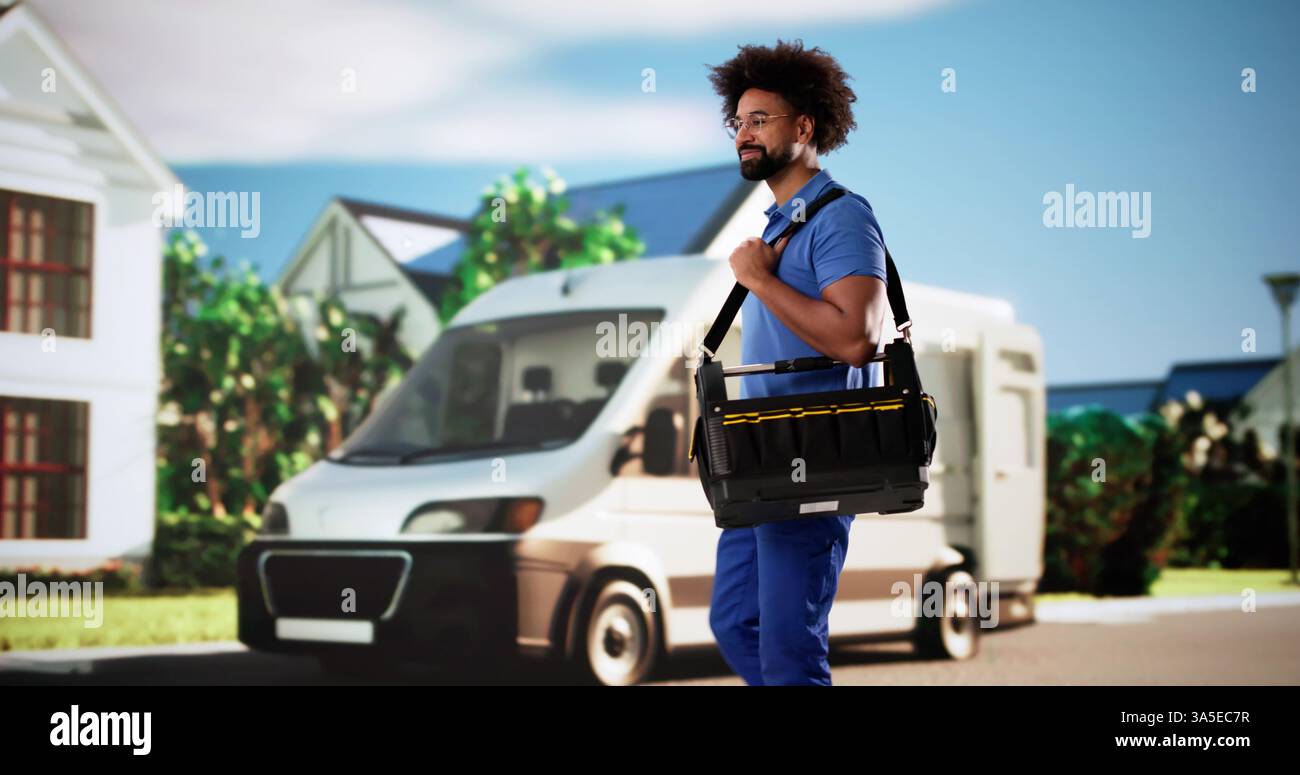 Skilled African American handyman with toolbox fixing house ...