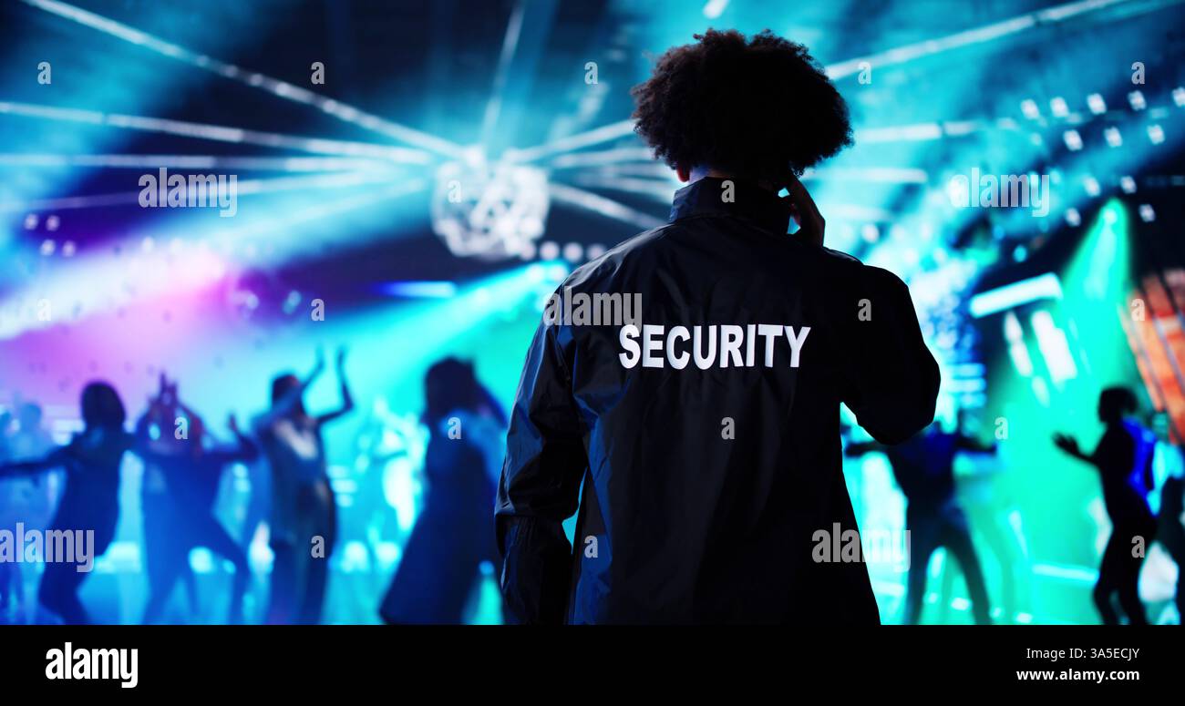 The African-American security guard stood watch at the nightclub ...