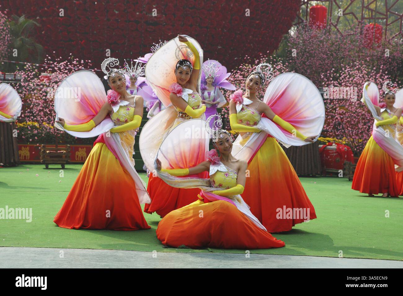 Chinese New Year. Chinese dance group in beautiful costumes that were ...