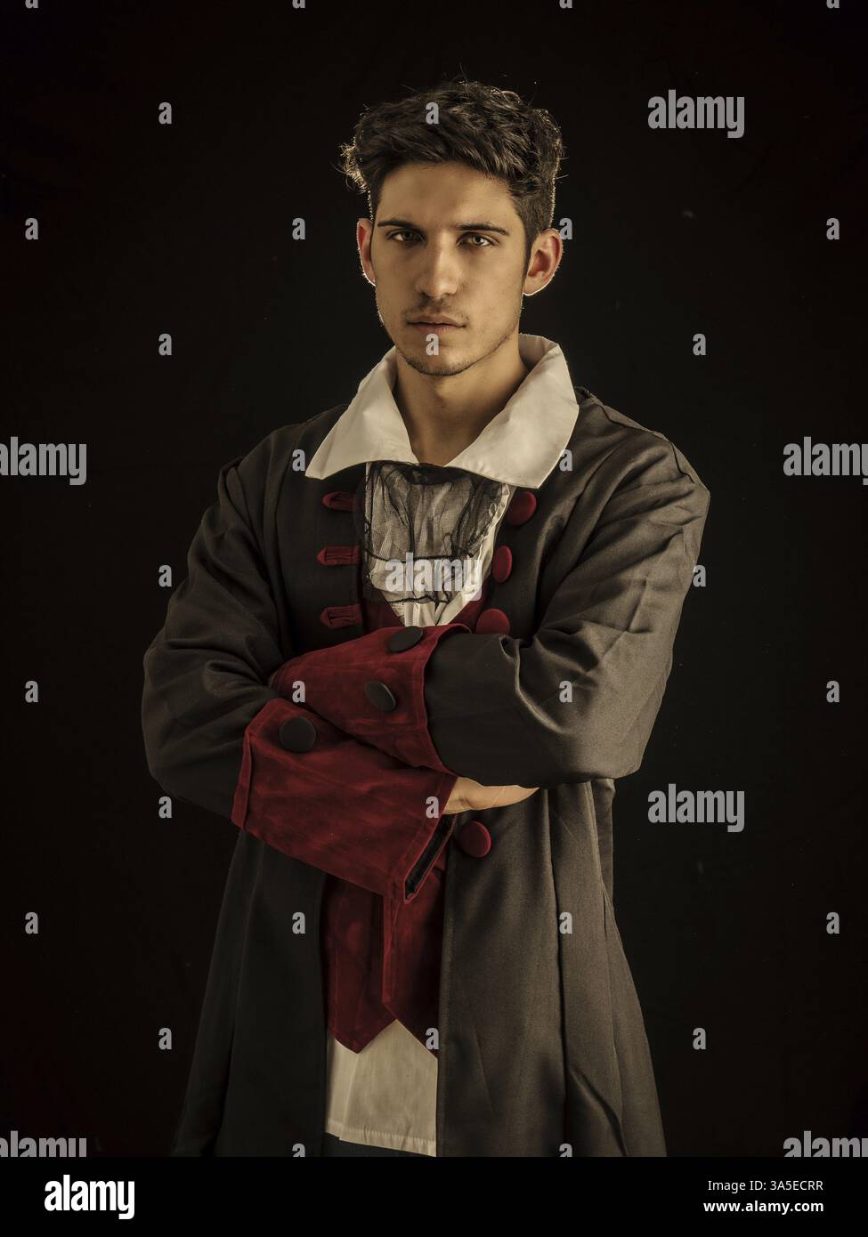 Confident young Hispanic male model dressed in elegant vintage style ...