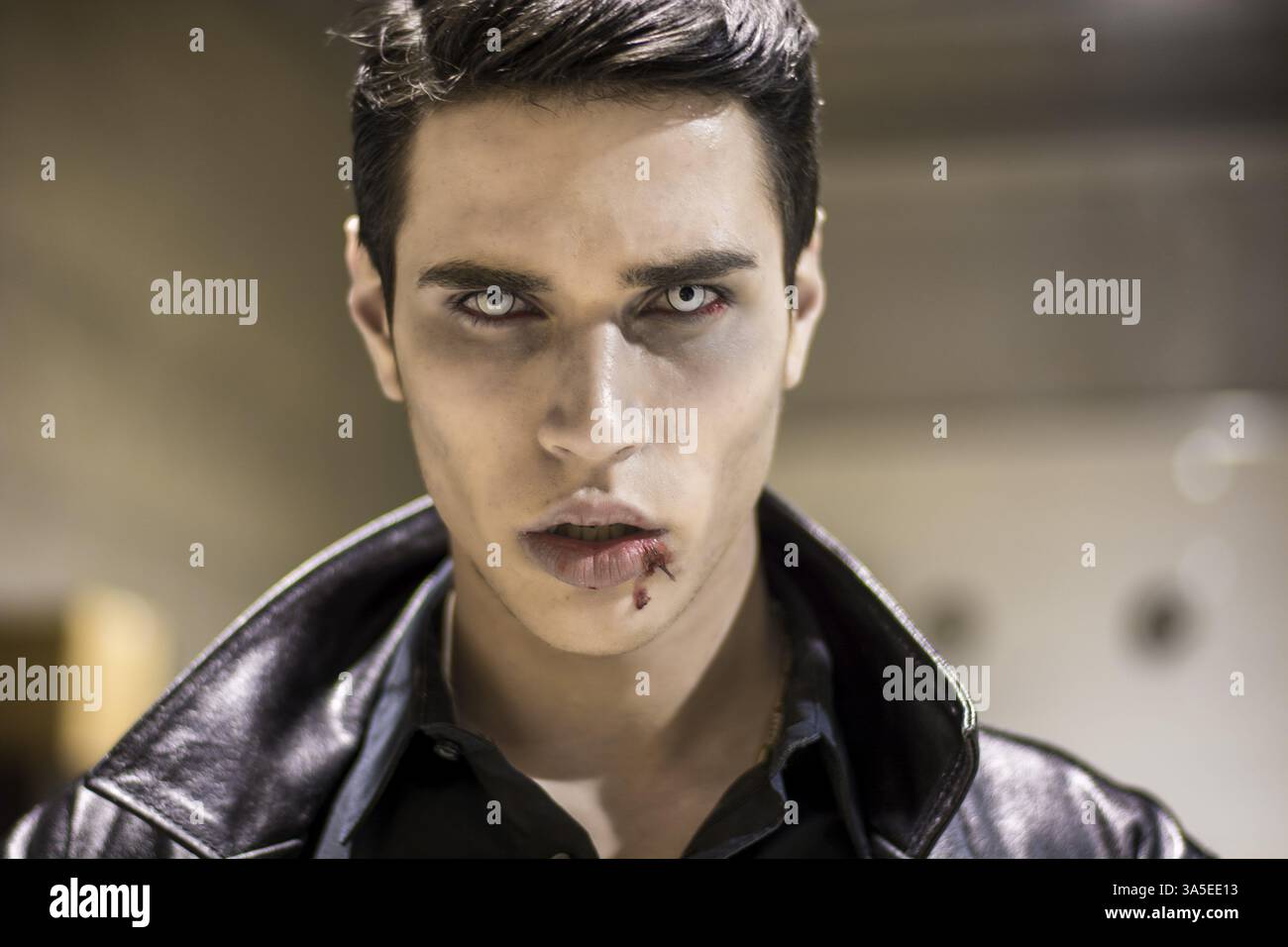 Close up Face of a Handsome Vampire Man in Leather Clothing, with Blood ...