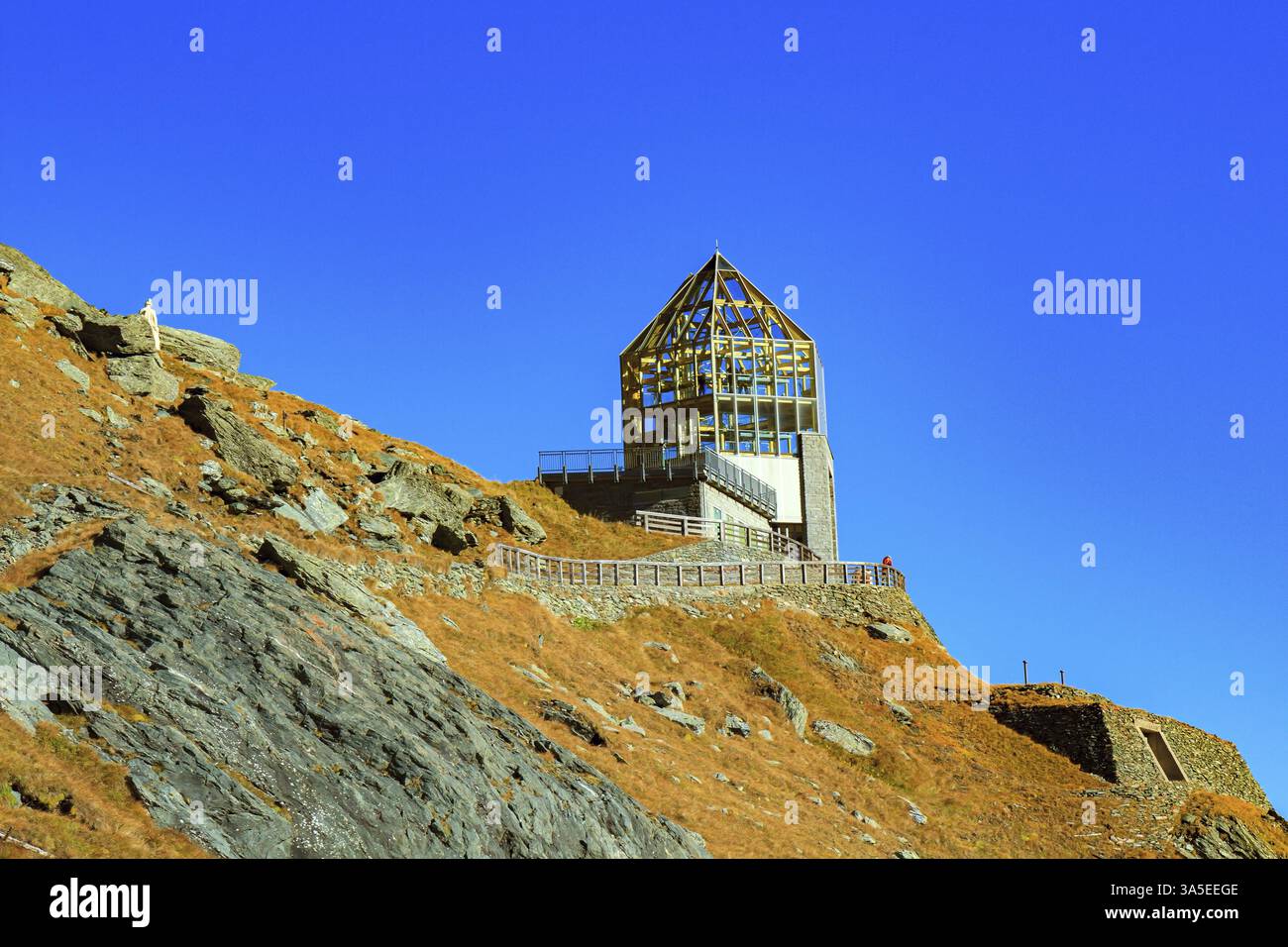 Stone lookout tower at a sharp turn. The famous panoramic mountain road ...