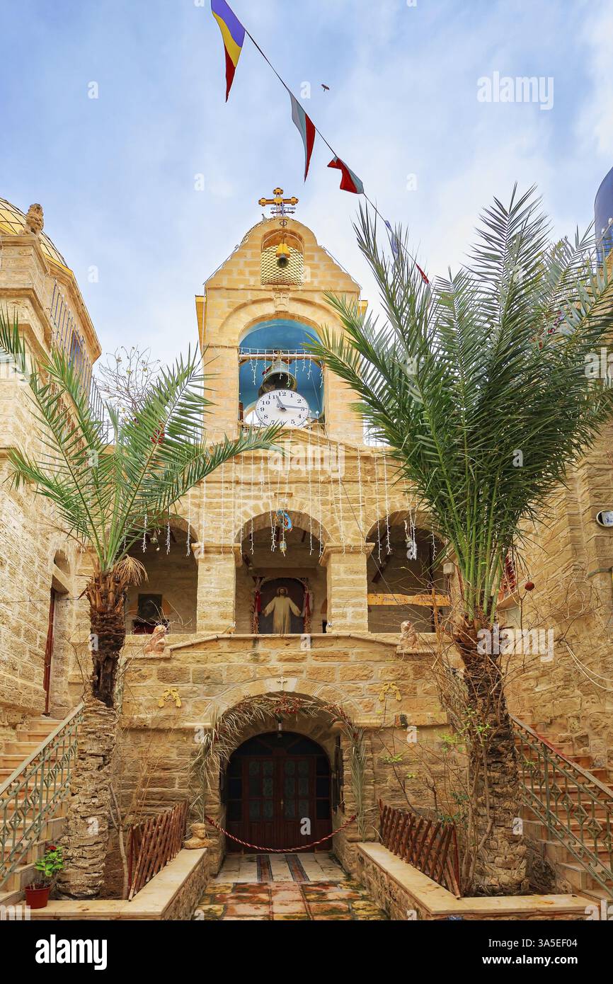 Small courtyard in Monastery of St. Gerasim of Jordan. The male ...