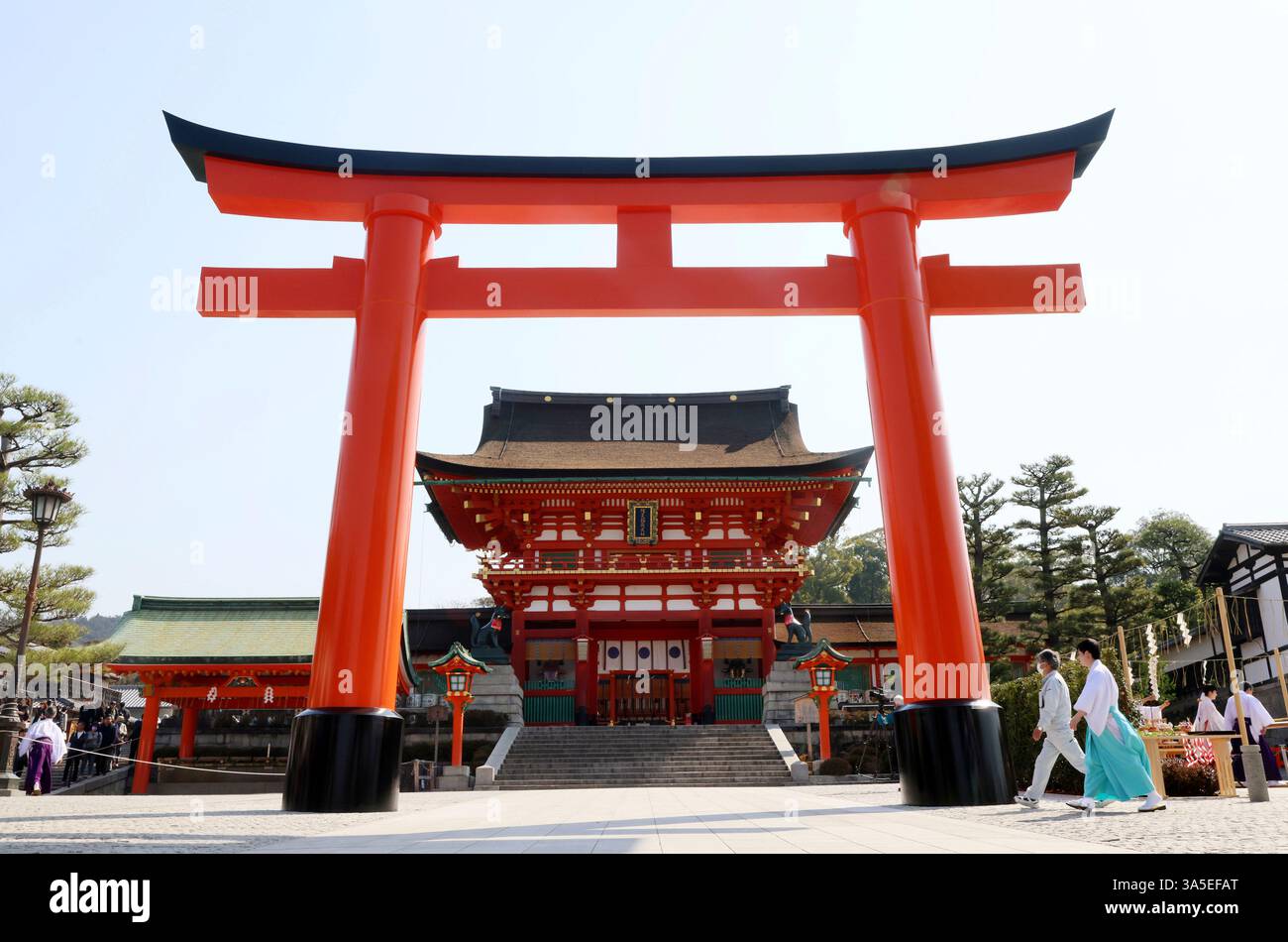 A photo shows the second torii gate on the approach to the shrine after ...