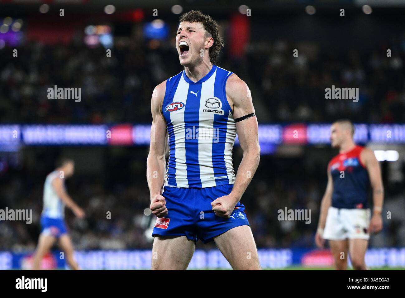 Nick Larkey of North Melbourne celebrates scoring a goal during the AFL ...