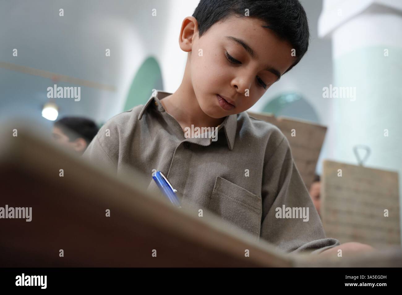 Misrata, Libya. 23rd Mar, 2025. A six-year-old student, one of the ...
