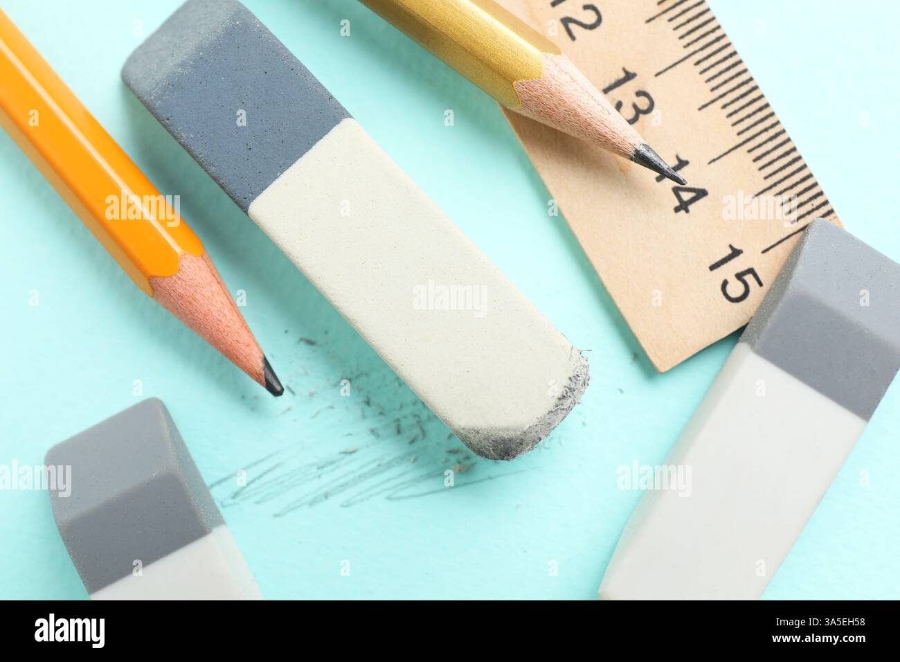 Erasers, pencils and ruler on light blue background, flat lay Stock ...