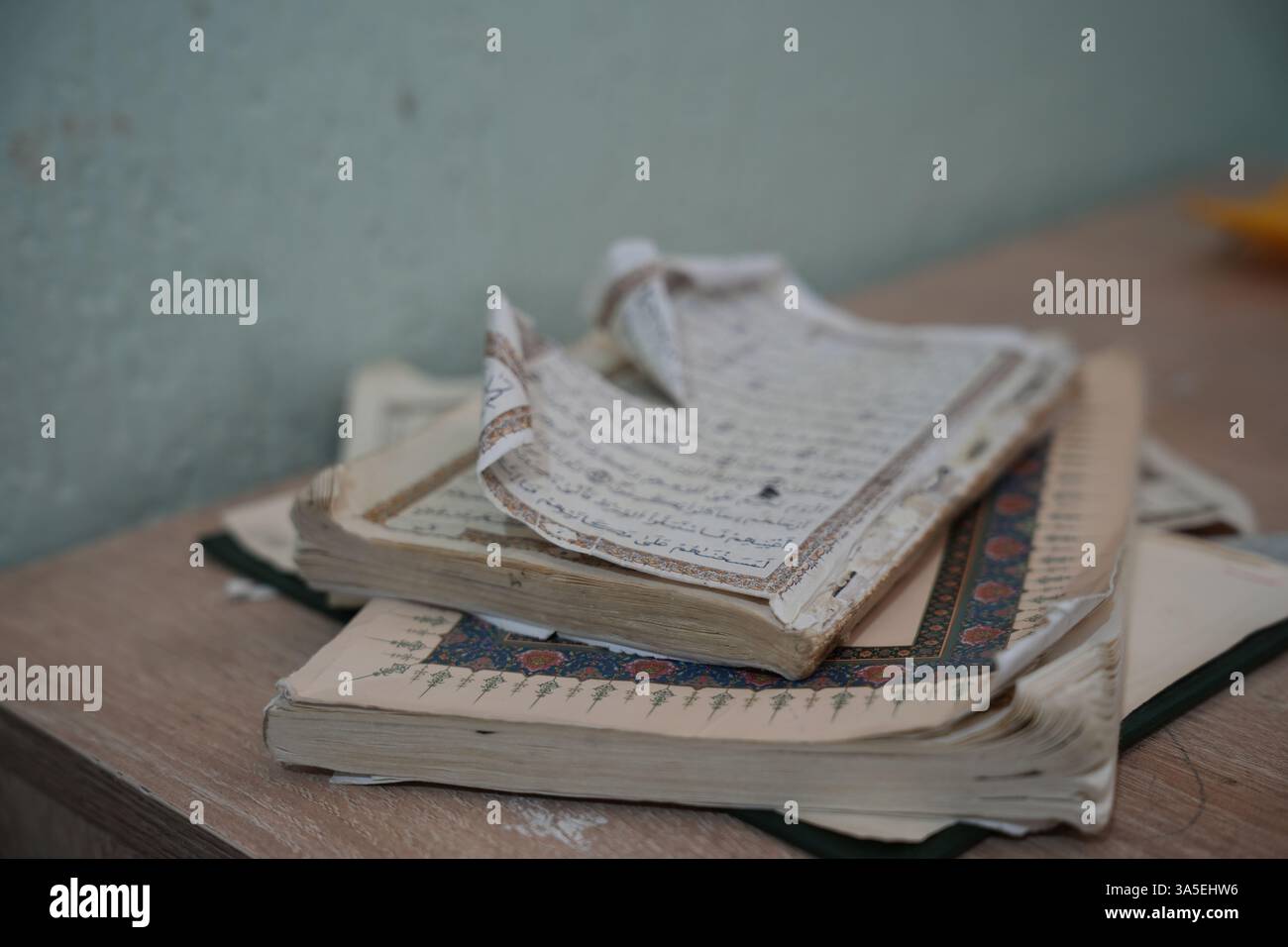 Misrata, Libya. 23rd Mar, 2025. The Holy Quran rests open inside one of ...