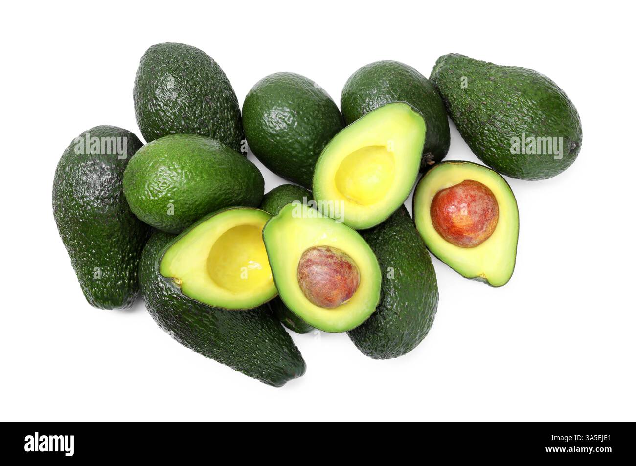 Many whole and cut avocados isolated on white, top view Stock Photo - Alamy