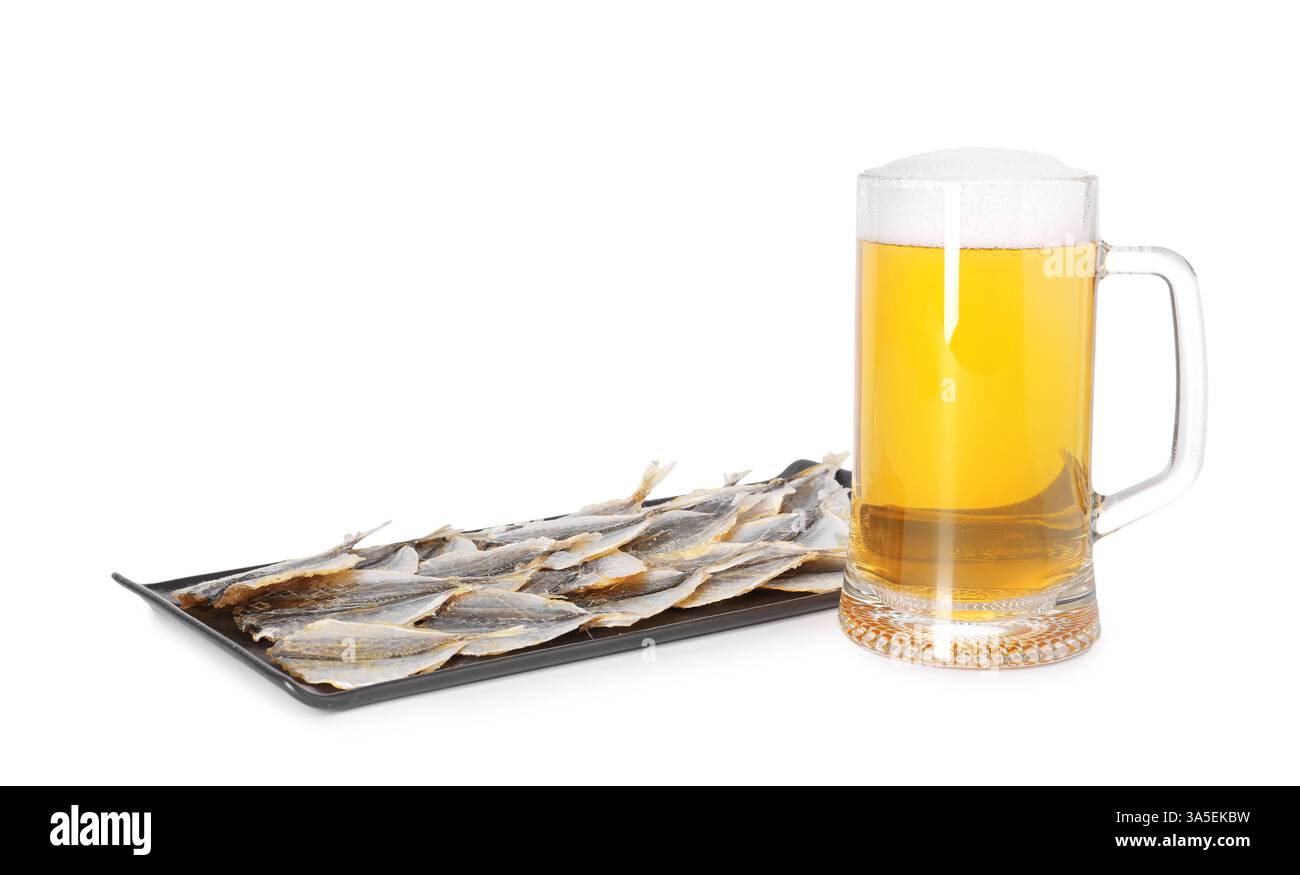 Glass of beer and dried fish fillets isolated on white Stock Photo - Alamy
