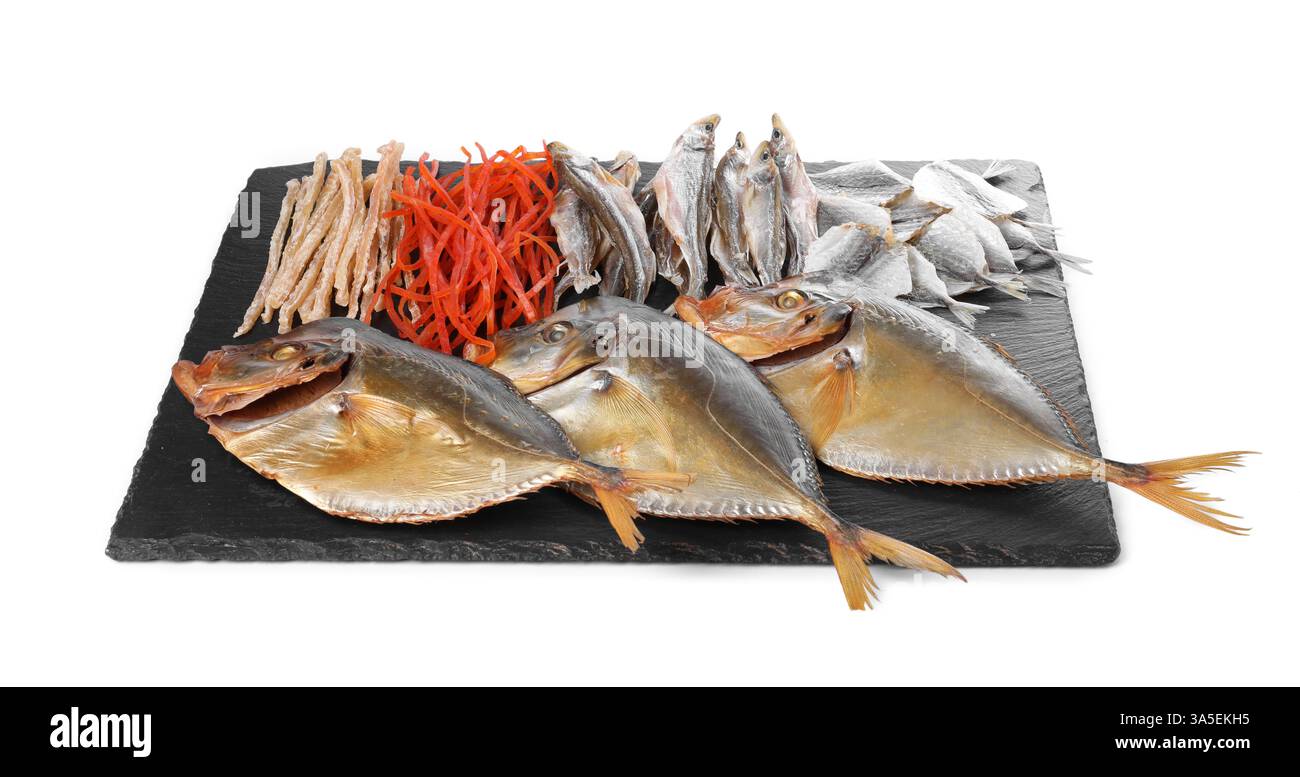 Many different dried fish snacks isolated on white Stock Photo - Alamy