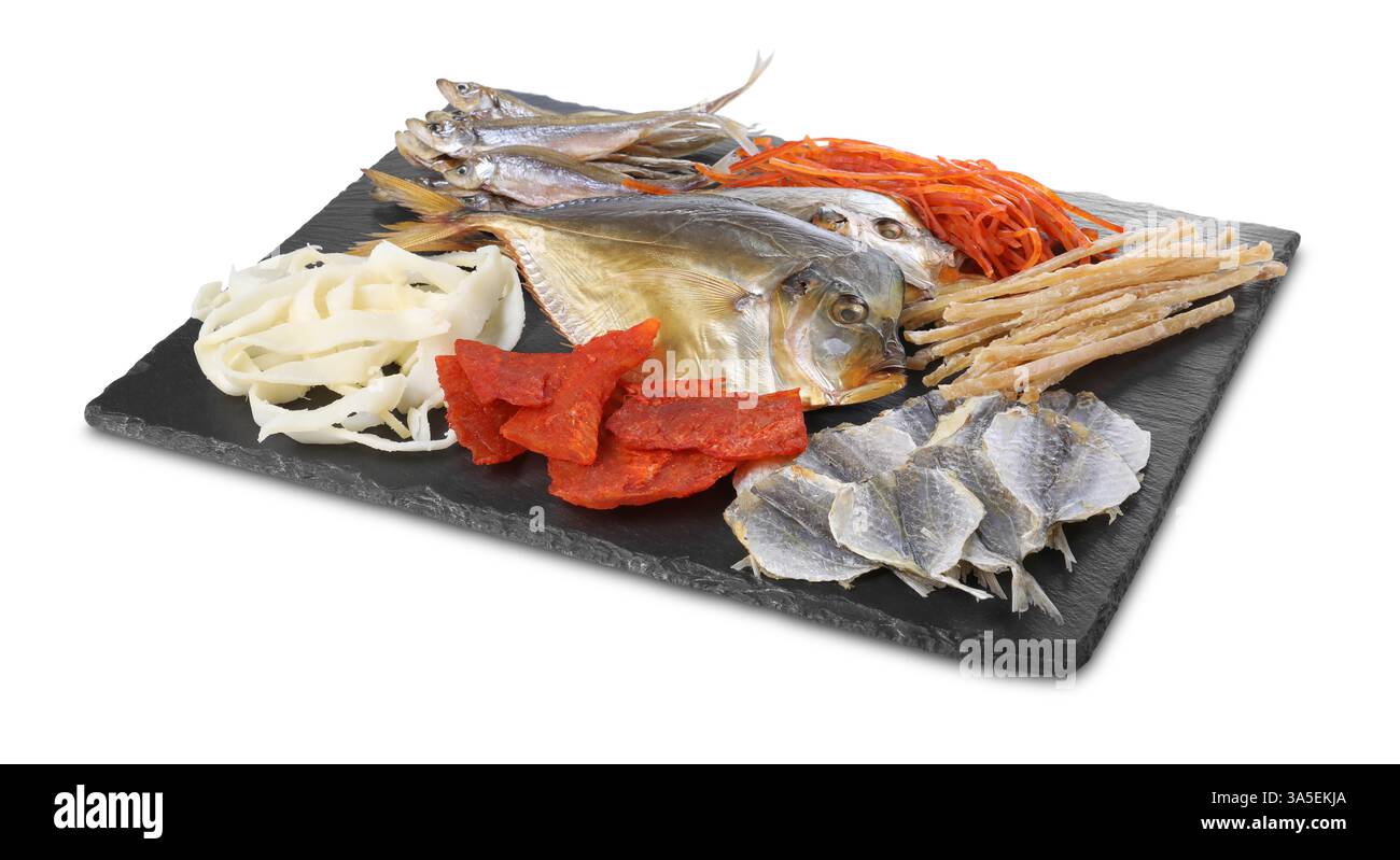 Many different dried fish snacks isolated on white Stock Photo - Alamy