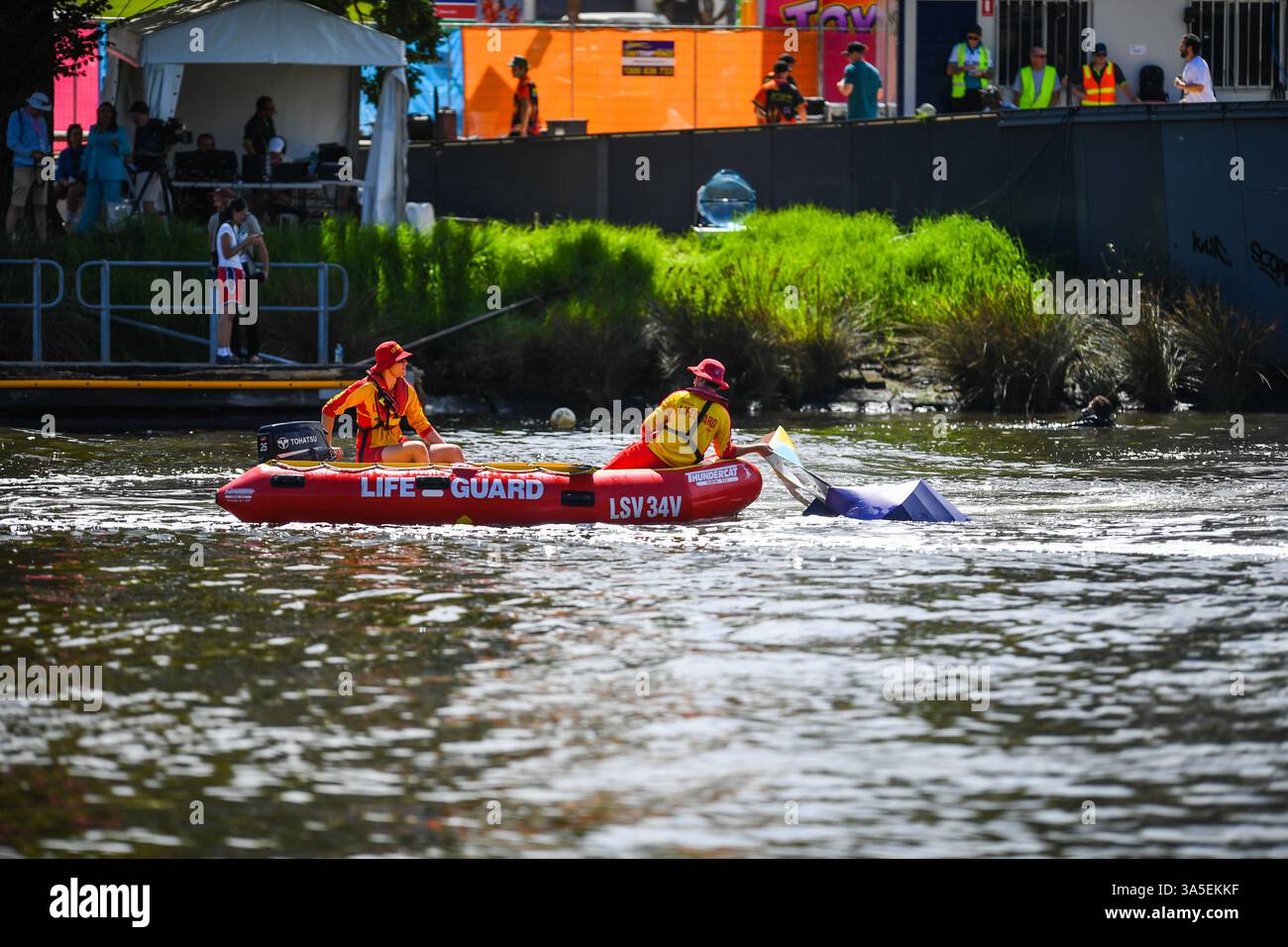 Melbourne, Australia. 09th Mar, 2025. Lifeguards are seen fishing out ...