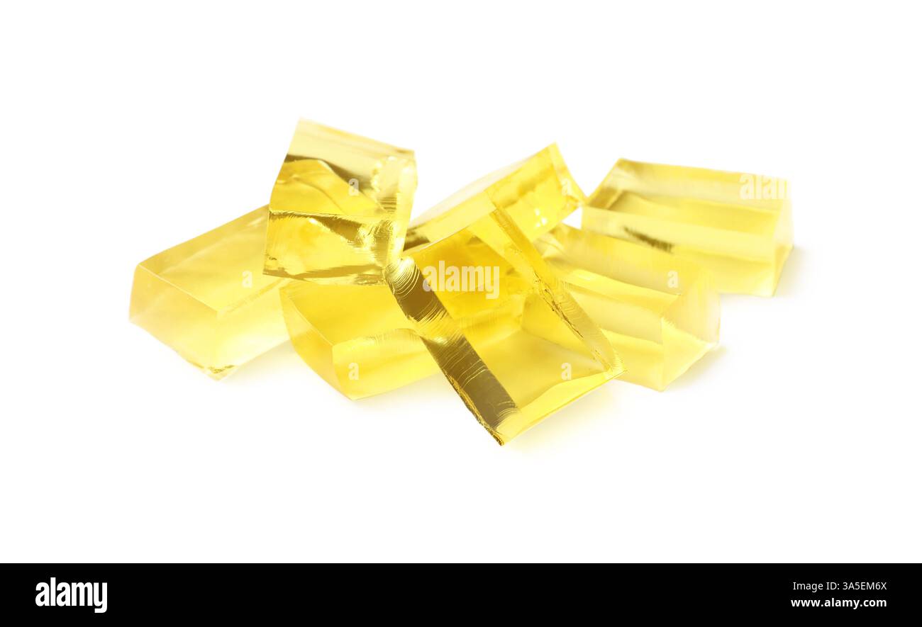 Tasty yellow jelly cubes isolated on white Stock Photo - Alamy