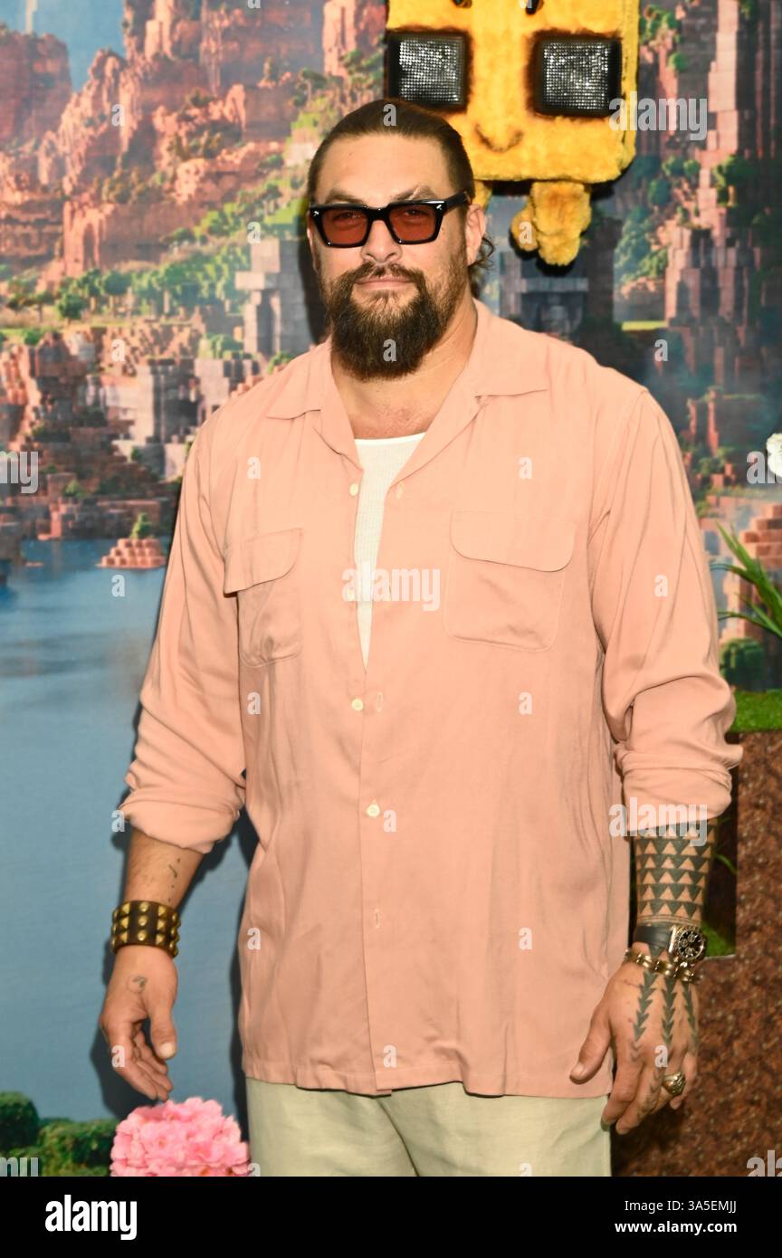 Actor Jason Momoa poses for photos during the red carpet of a Minecraft Movie fan event at ...