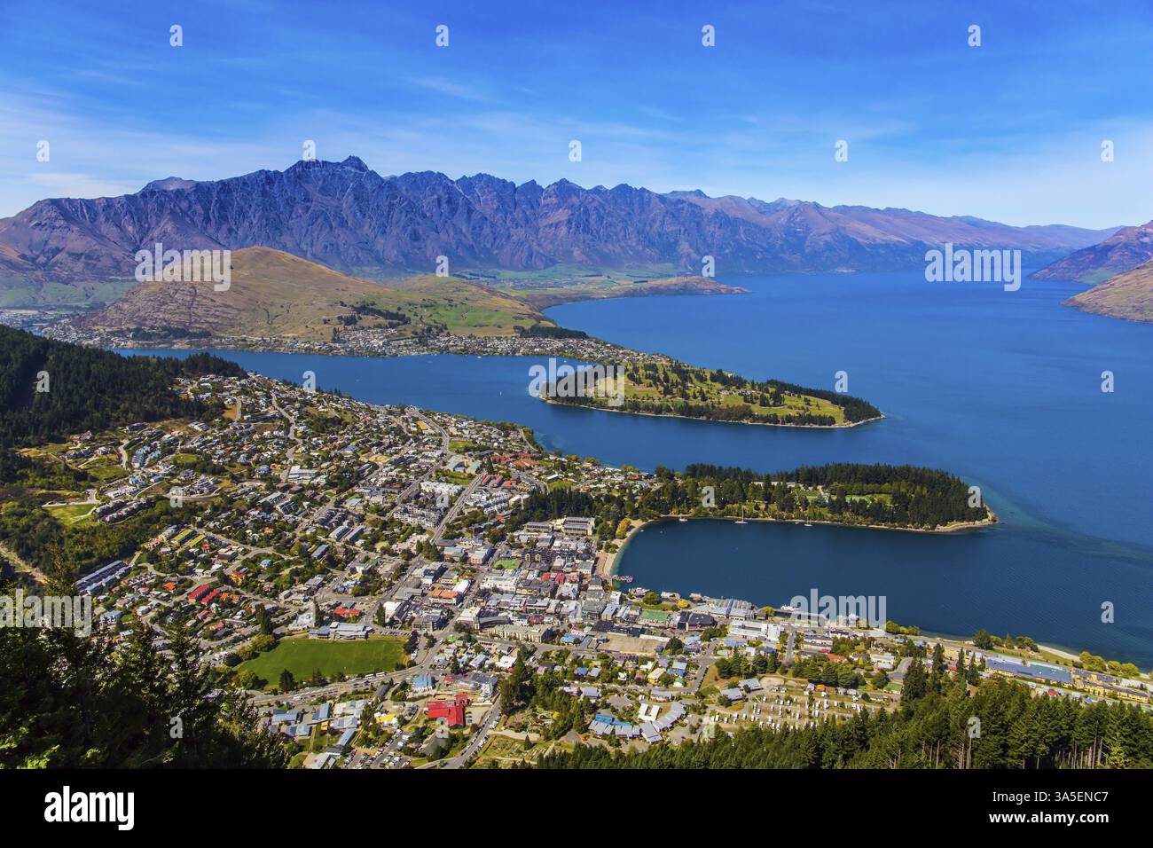 Travel to New Zealand, South Island. Huge azure lake among the ...