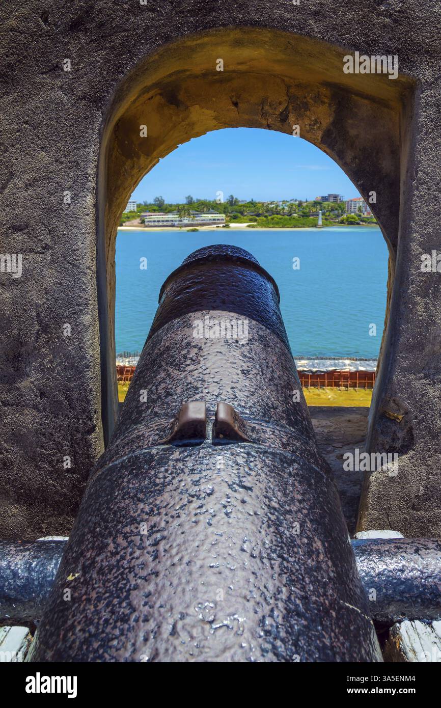 Loophole and gun in the thick ancient walls. Fort Jesus - medieval ...