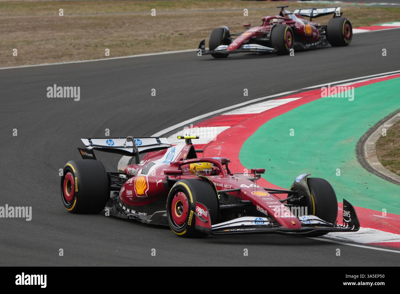 Ferrari driver Lewis Hamilton of Britain steers his car during the ...