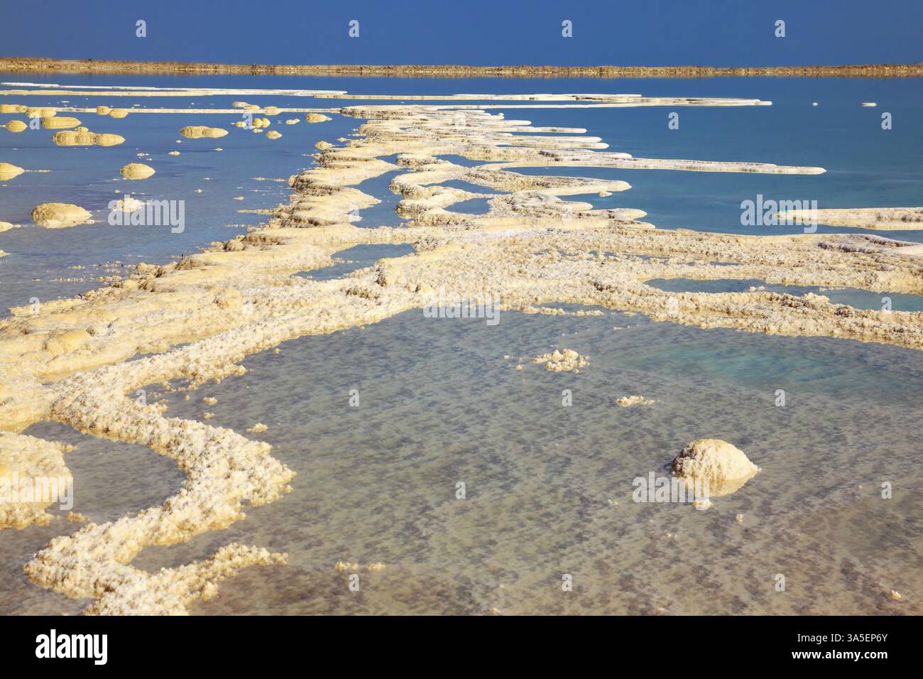 The picturesque road from the evaporated salt in the Dead Sea. Salt ...