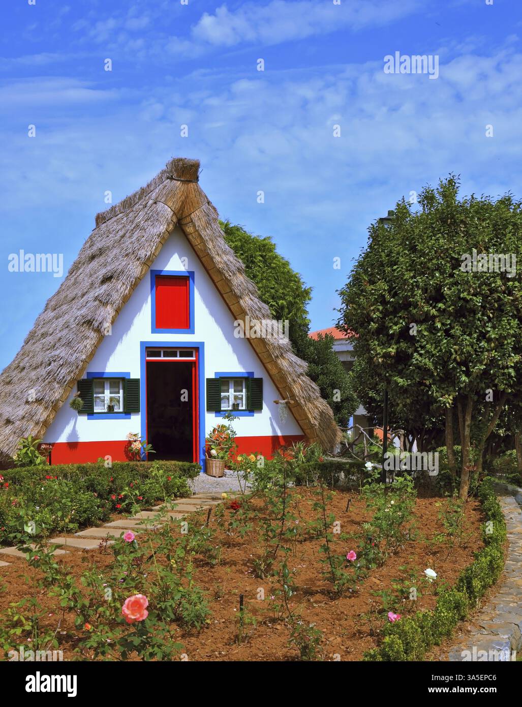 Charming rural house. Thatched house with a gable roof, two small ...