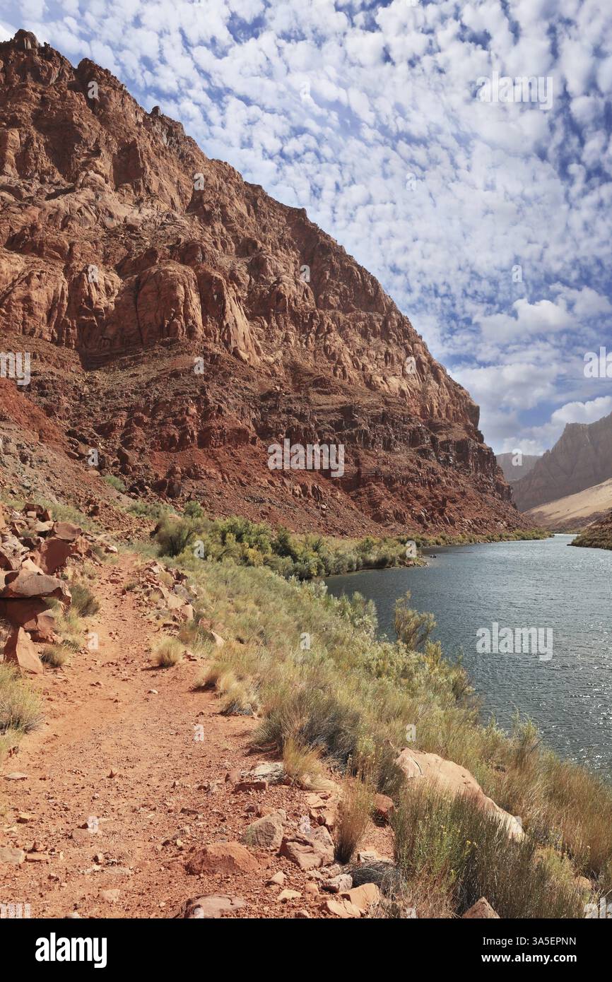 Pure emerald Colorado River among the steep mountains of red sandstone ...
