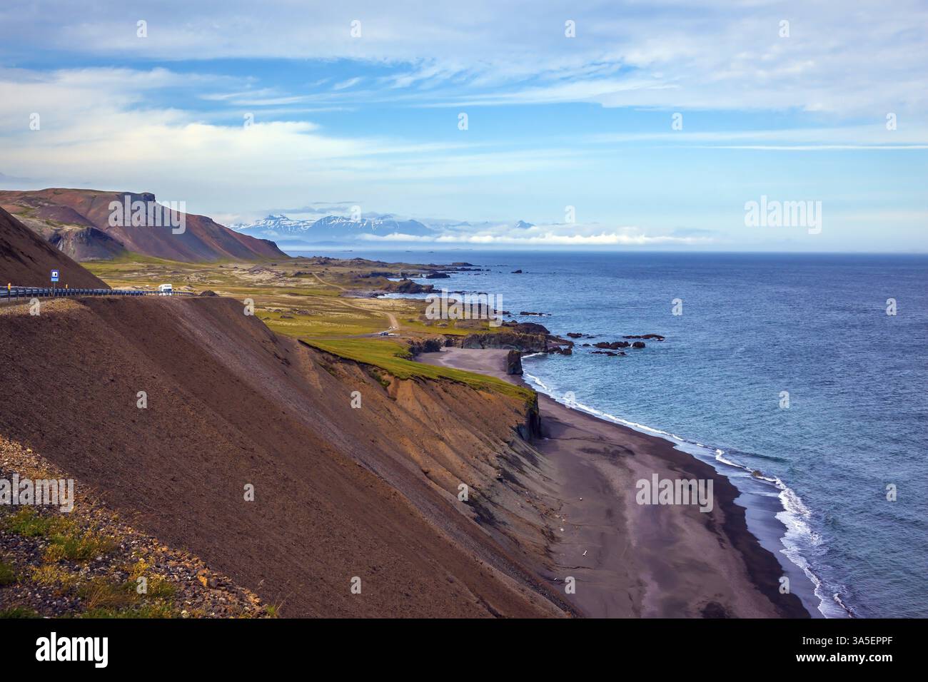 The road along the Atlantic coast runs along the steep slope of cooled ...