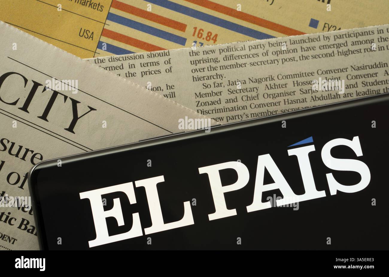 The logo of the newspaper EL PAIS is displayed on a smartphone screen ...