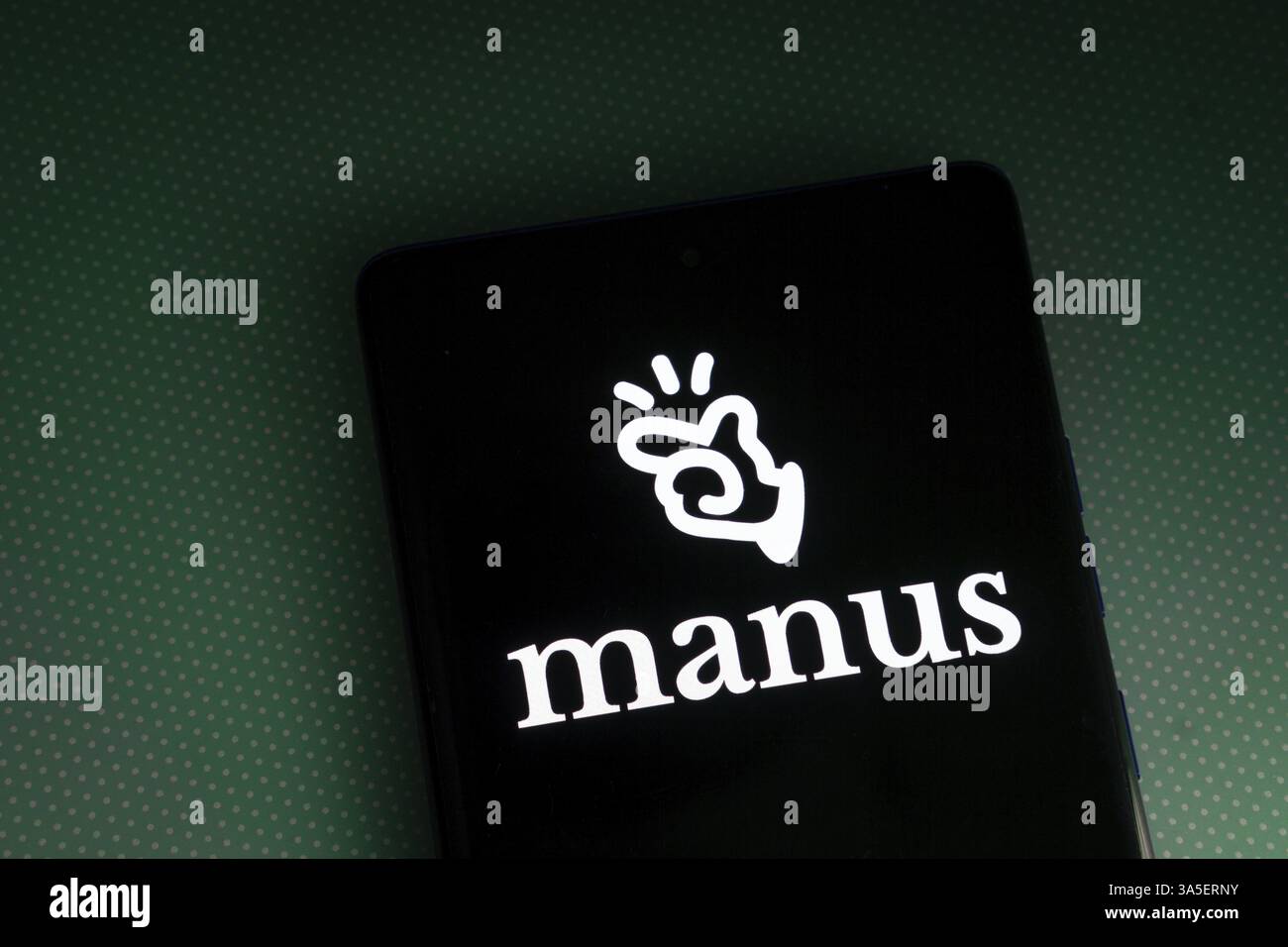 Close up of Manus logo on screen of mobile phone Stock Photo - Alamy