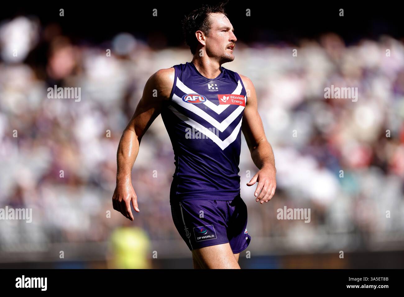 Perth, Australia. 23rd Mar, 2025. Brennan Cox of the Dockers looks on ...