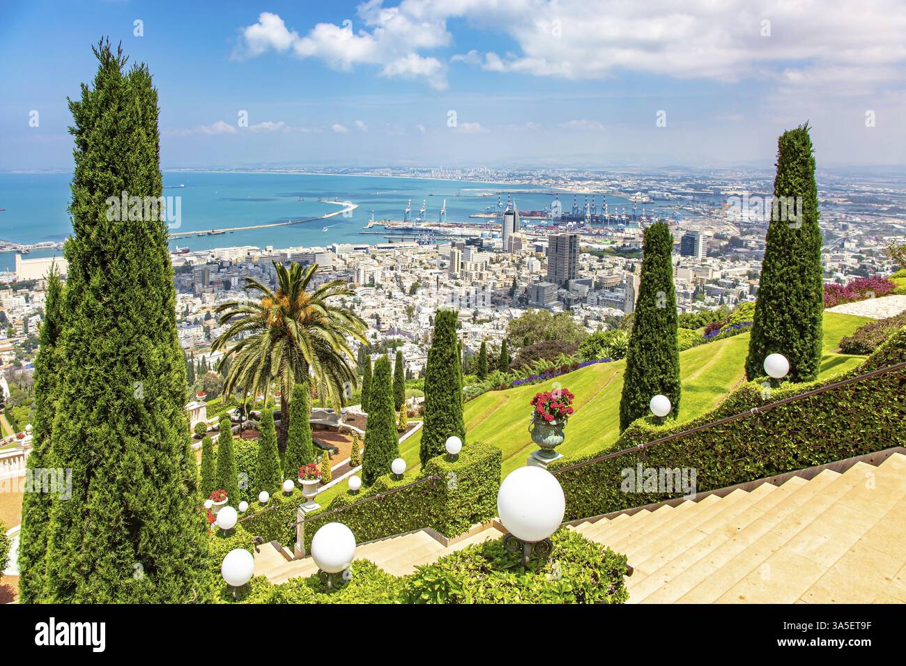 Gorgeous colorful gardens, flower beds, cypress and green lawns attract ...