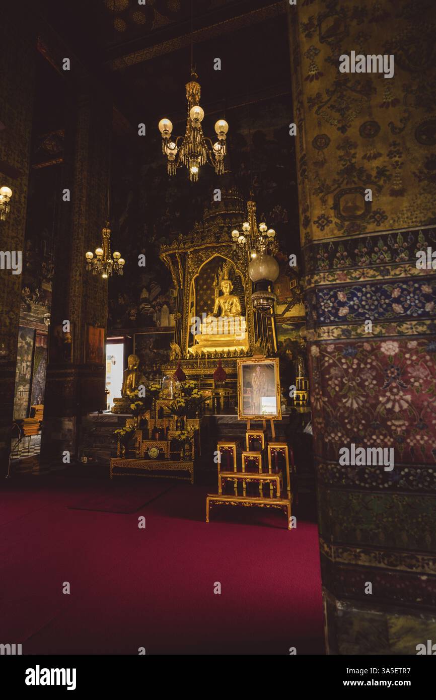 Magnificent temple interior with meticulous lighting, main statue and ...