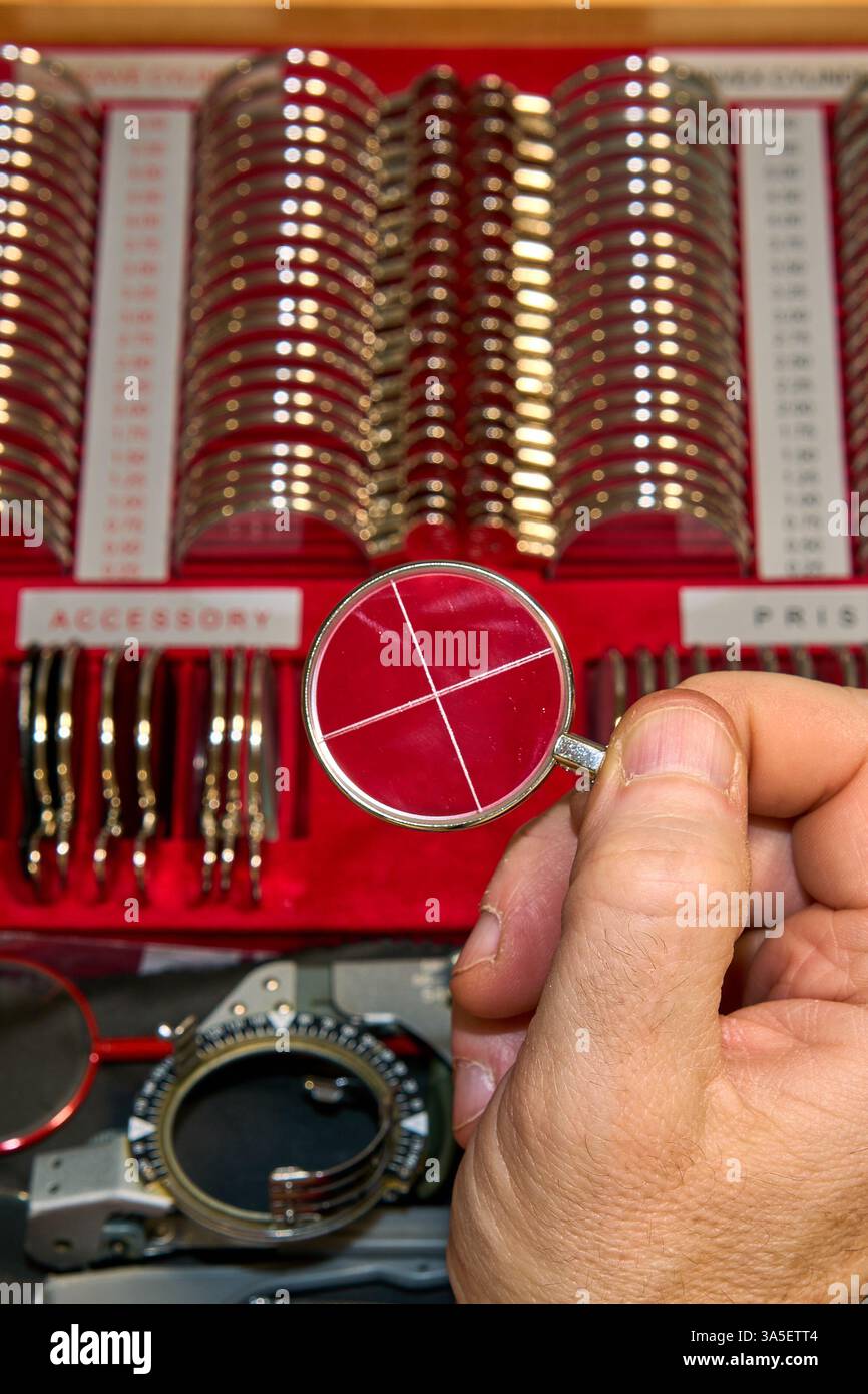 The image shows a trial lens set, an instrument used by optometrists to ...