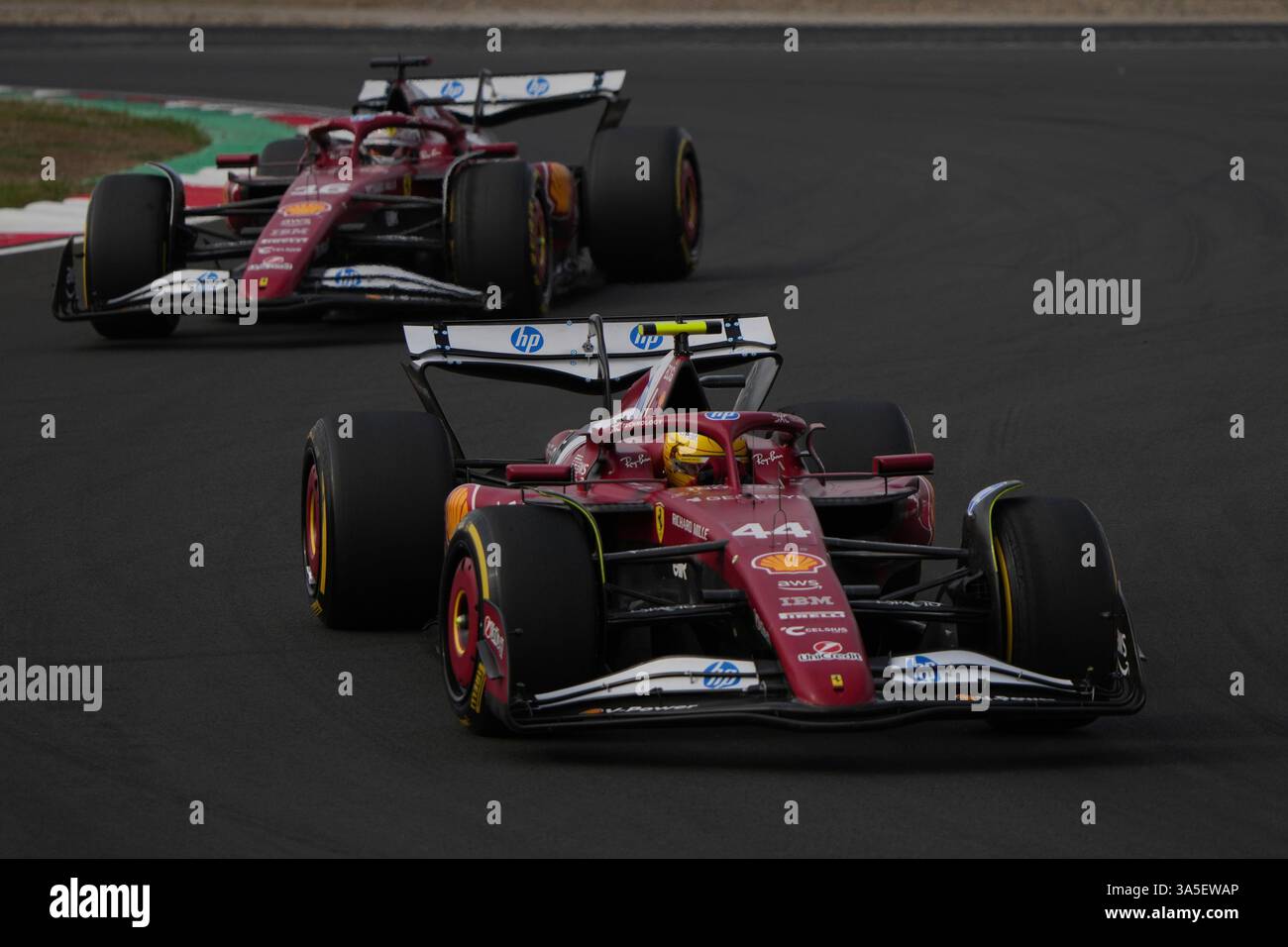 Ferrari driver Lewis Hamilton of Britain steers his car during the ...